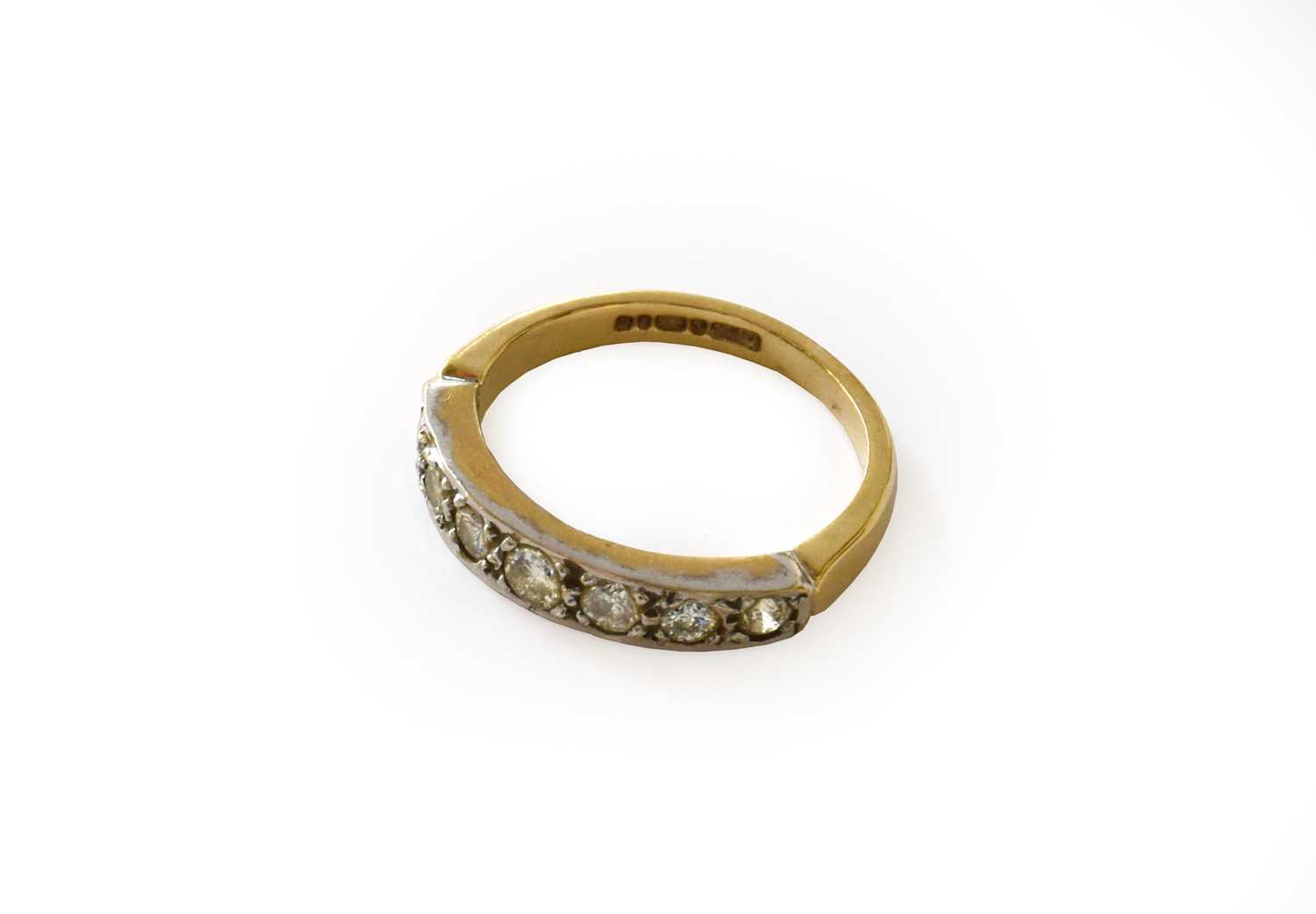 Lot 315 - A 9 Carat Gold Diamond Seven Stone Ring,