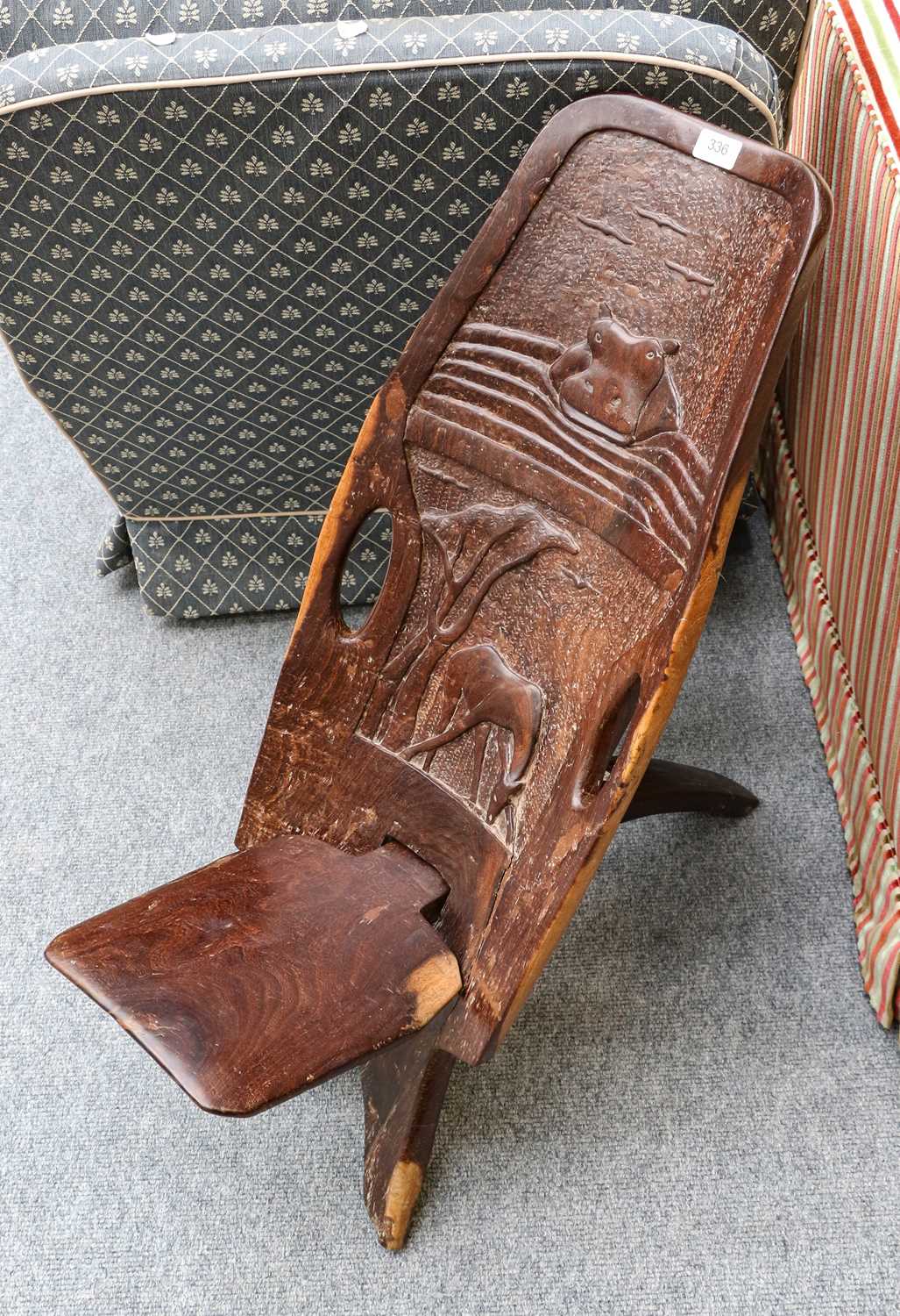 Lot 336 - An African birthing chair carved with a