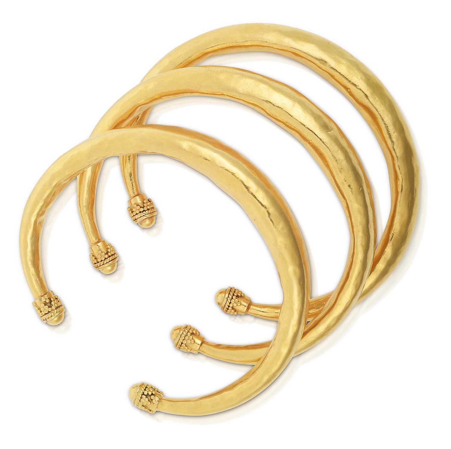 Lot 2250 - Three Torque Bangles,