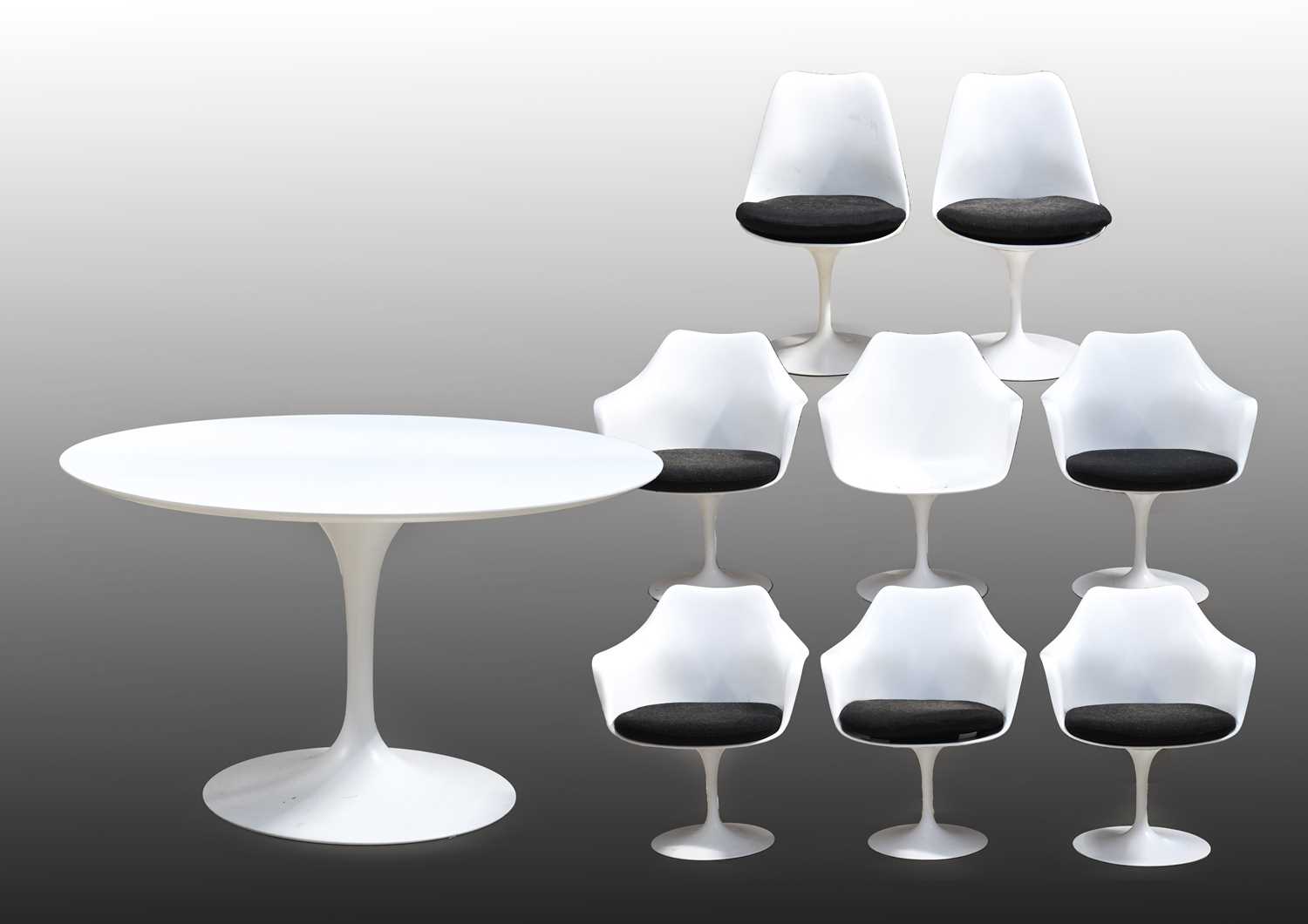 Lot 1263 - A Tulip Style Dining Table, laminate