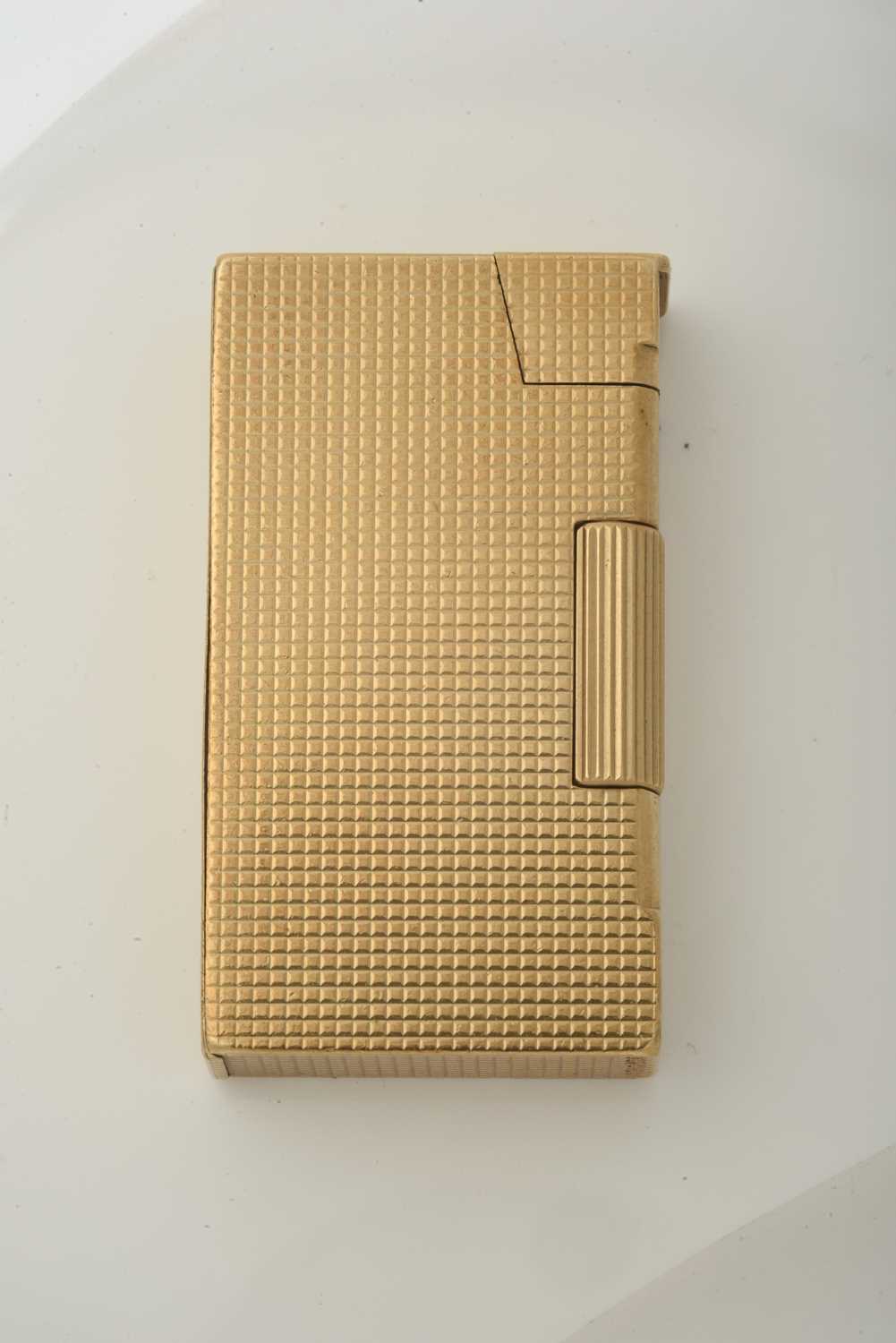 Lot 2070 - An Elizabeth II Gold Cigarette-Lighter