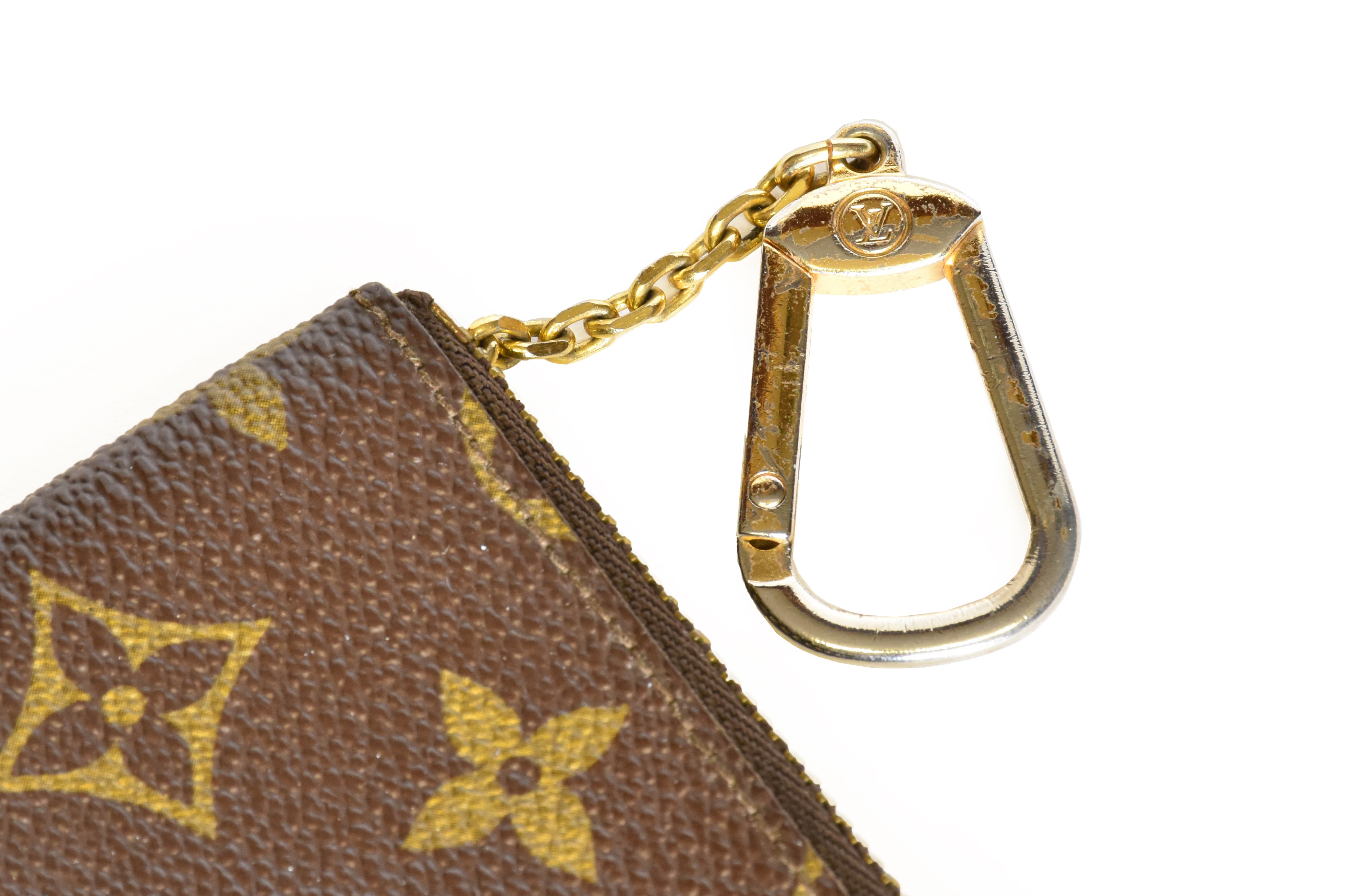 Lot 5058 - Louis Vuitton LV Monogrammed Canvas Zipped