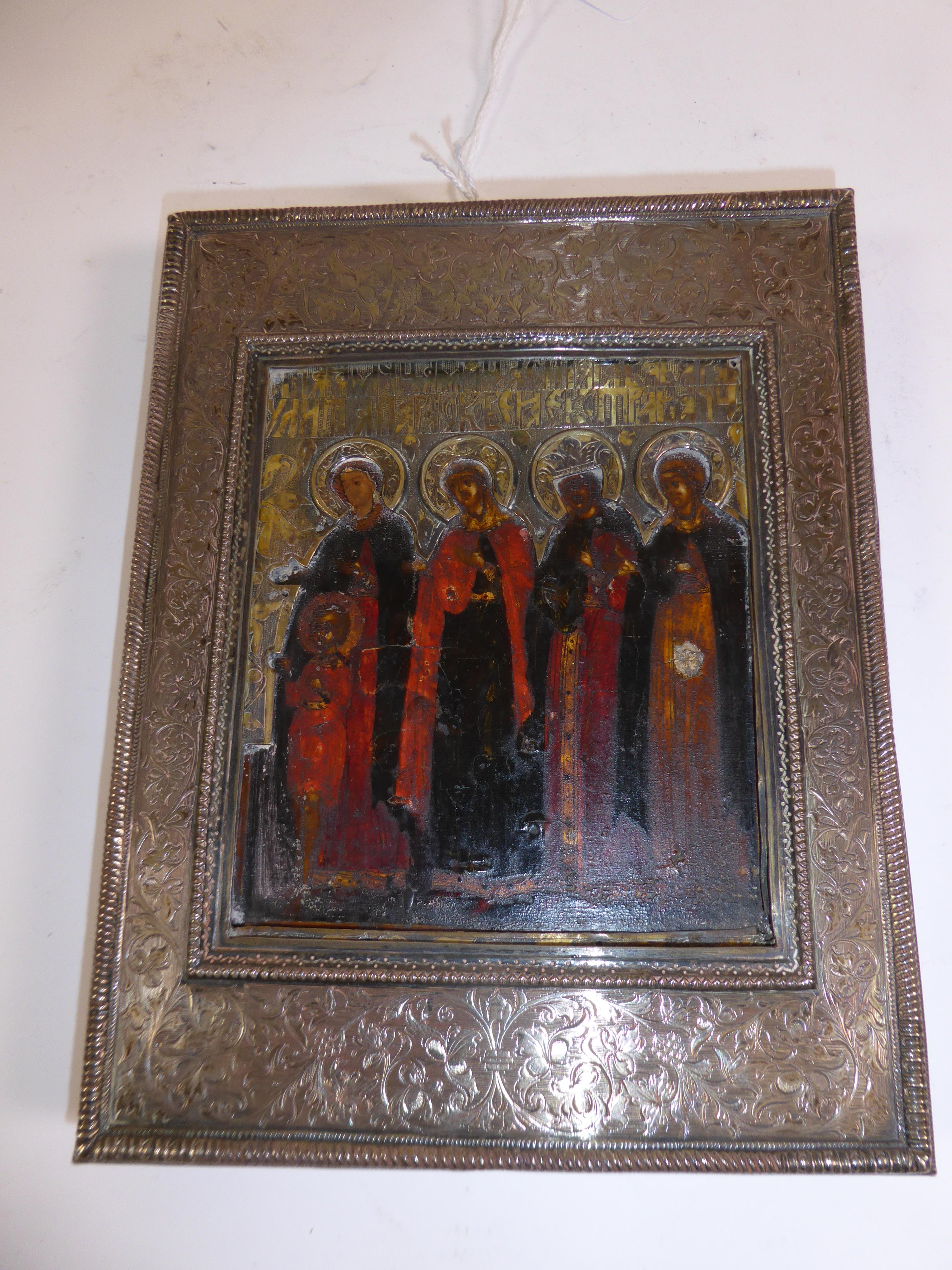 Lot 2042 - A Russian Parcel-Gilt Silver Mounted Icon