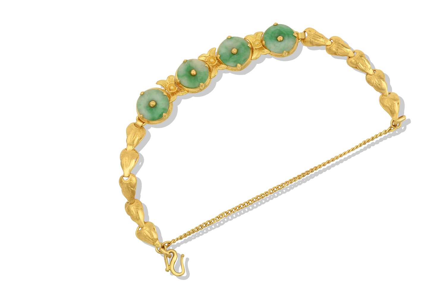 Lot 2301 - A Jade Bracelet four jade discs with a