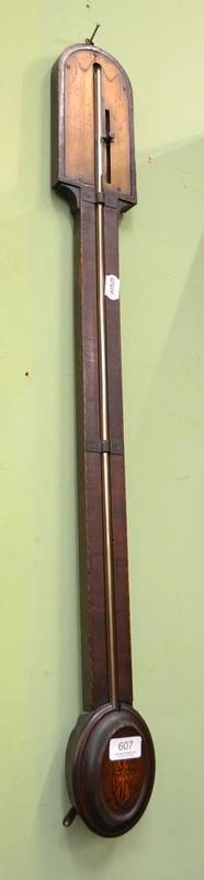 Lot 607 - An 18th century mahogany stick barometer the