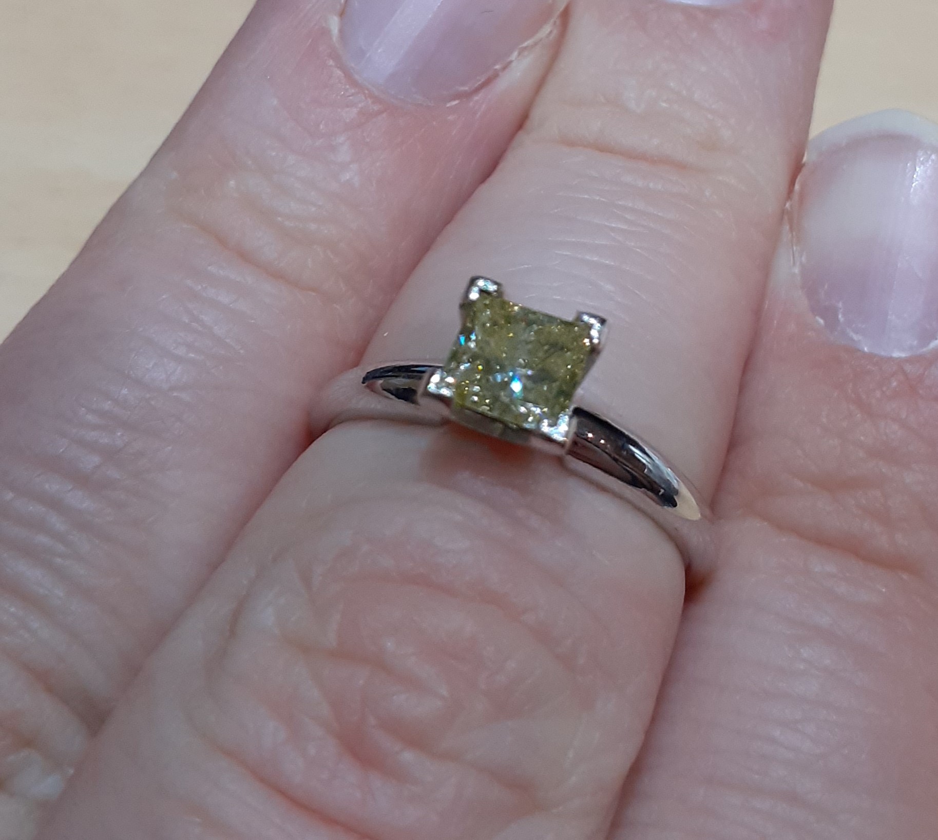 Lot 2343 - A Diamond Solitaire Ring the fancy yellow