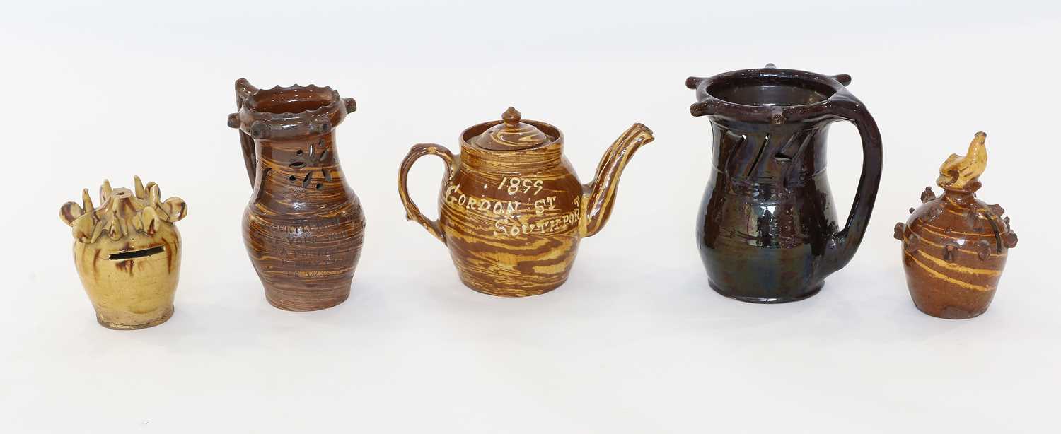 Lot 138 - A Slipware Double-Spout Teapot and Cover,