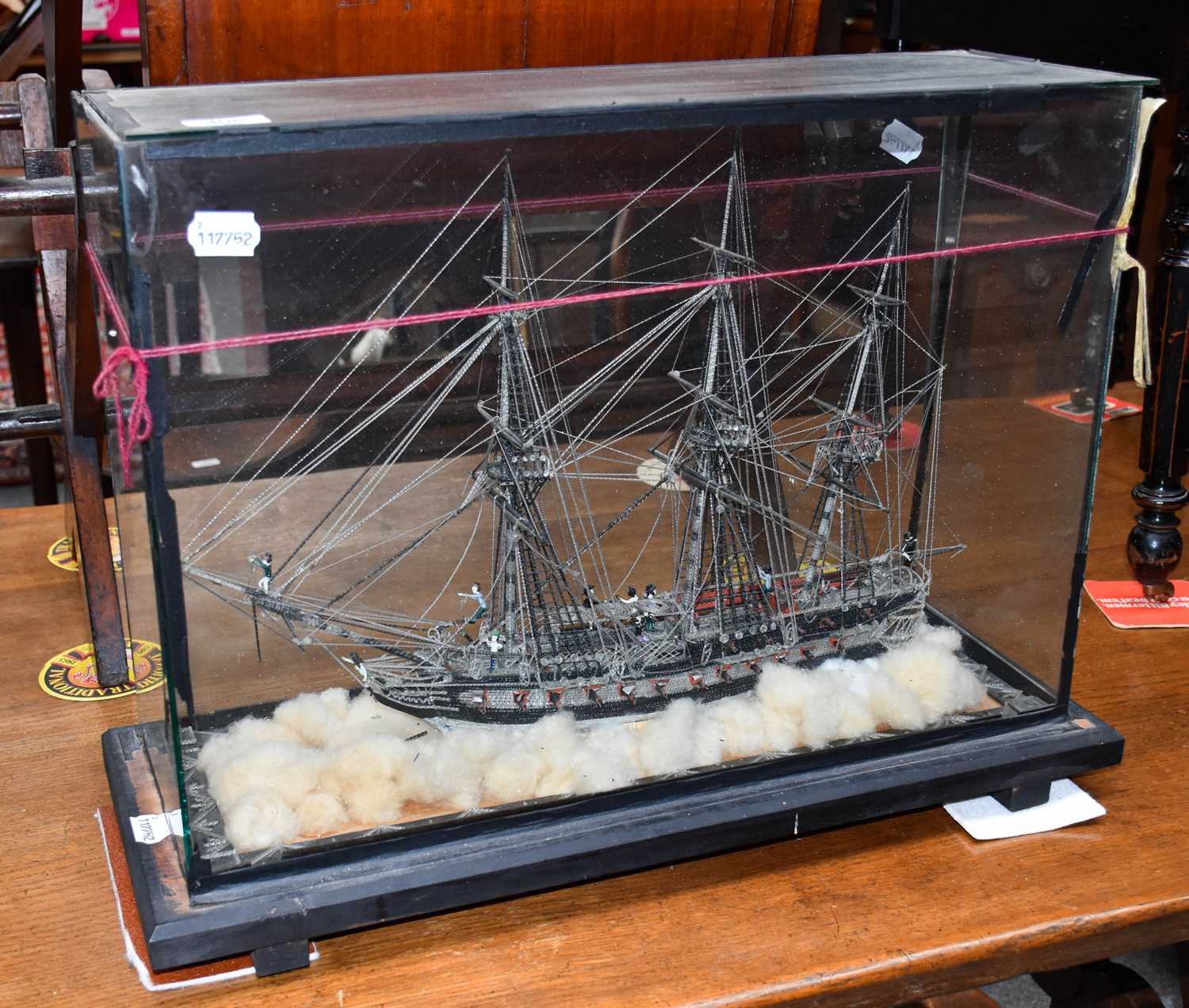 Lot 406 - A Cased Victorian Glass Frigger, of a triple