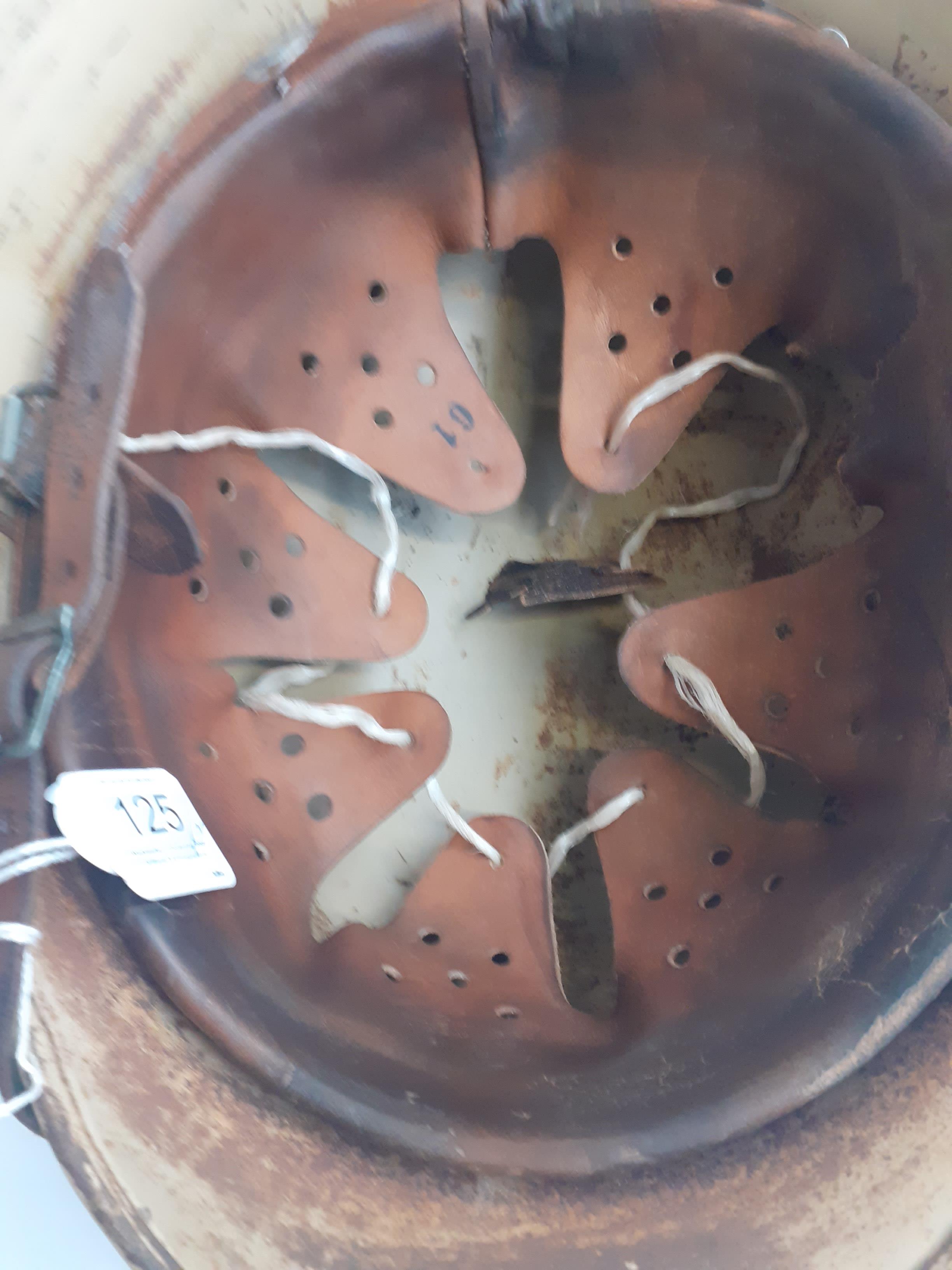 Lot 125 - A Second World War German M35 Helmet,