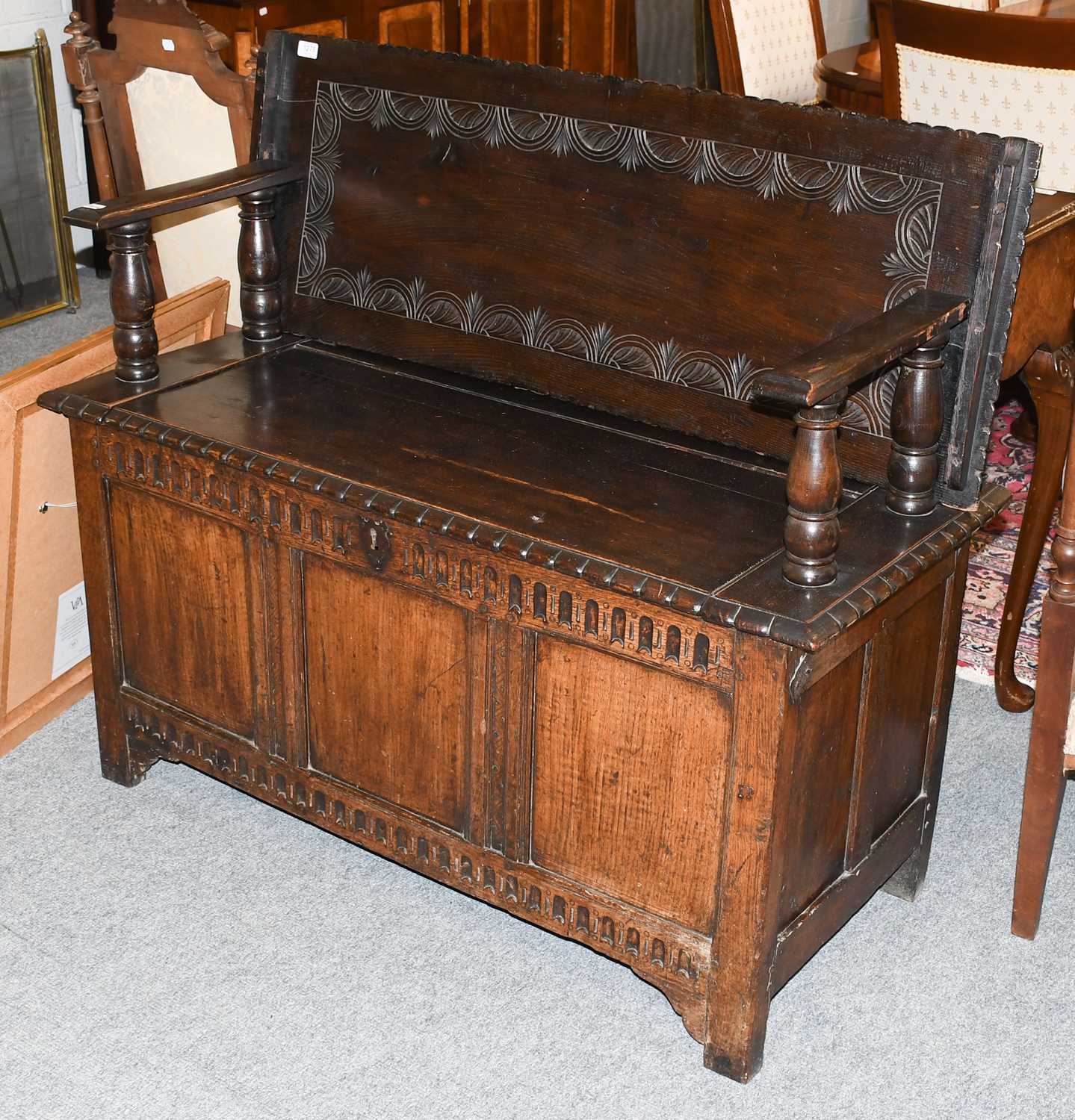 Lot 1278 - A Carved Oak Monk's Bench, 18th century in