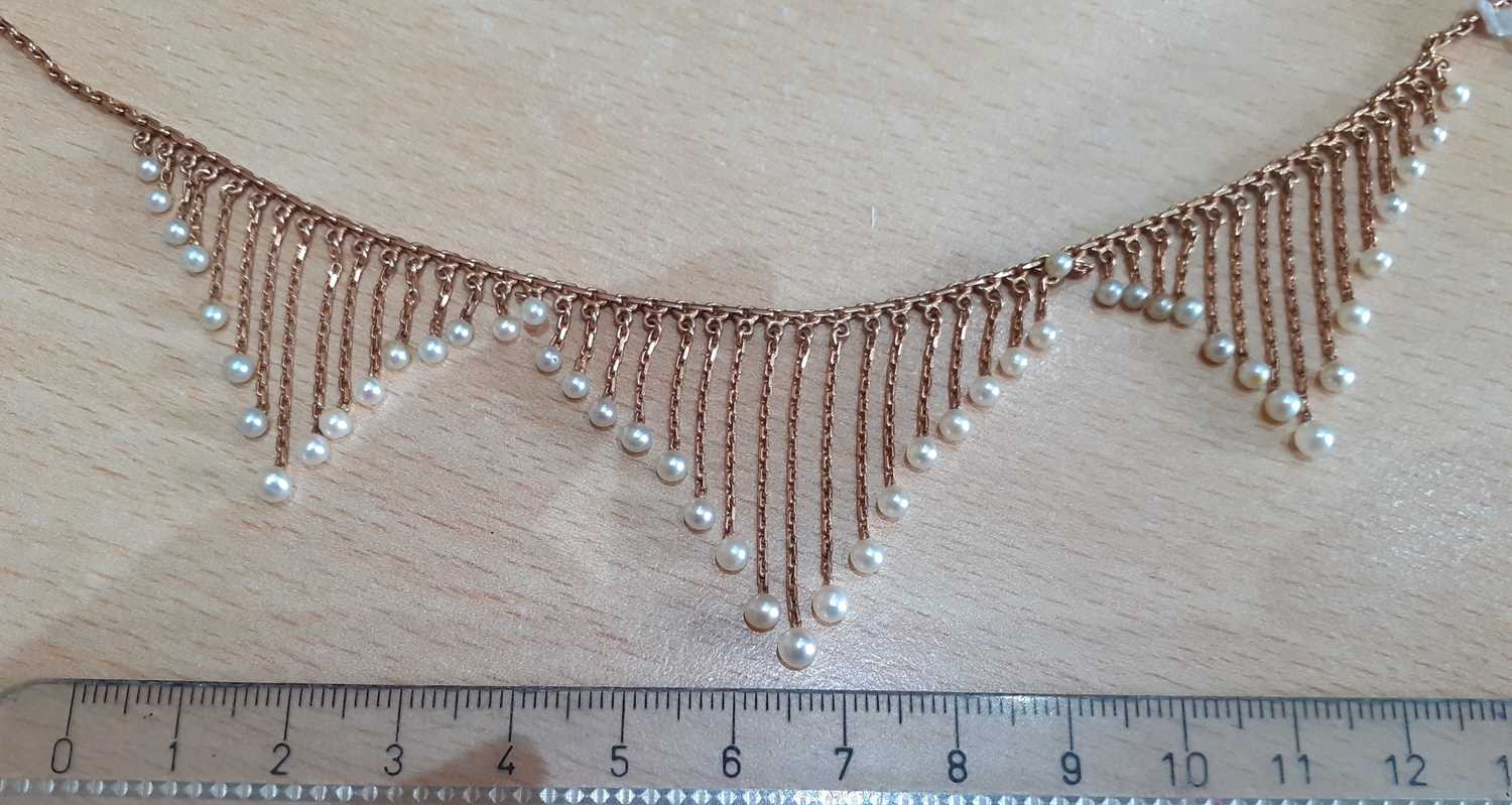 Lot 2159 - A Seed Pearl Fringe Necklace the yellow box