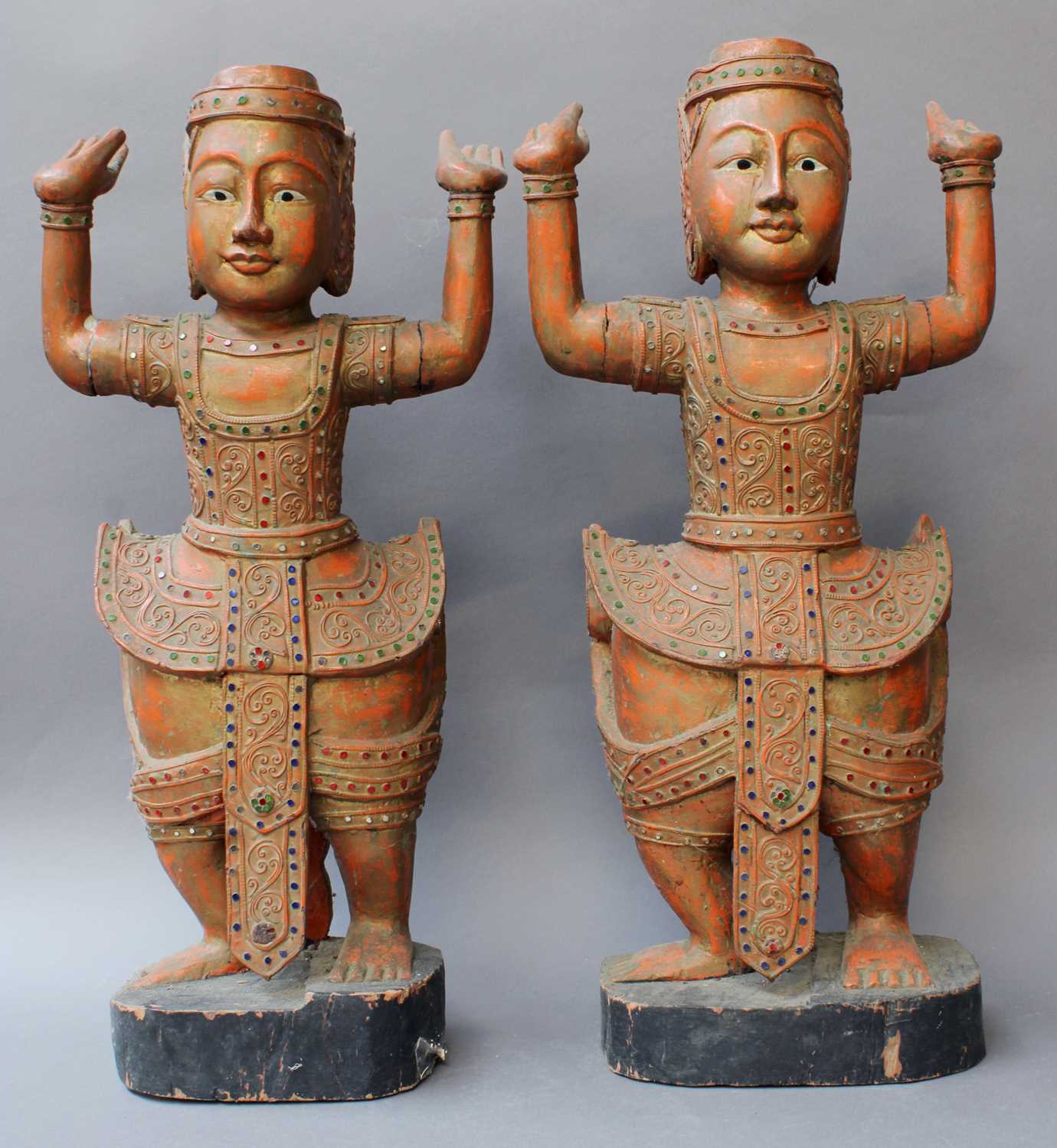 Lot 54 - A Pair of South East Asian Carved and Painted