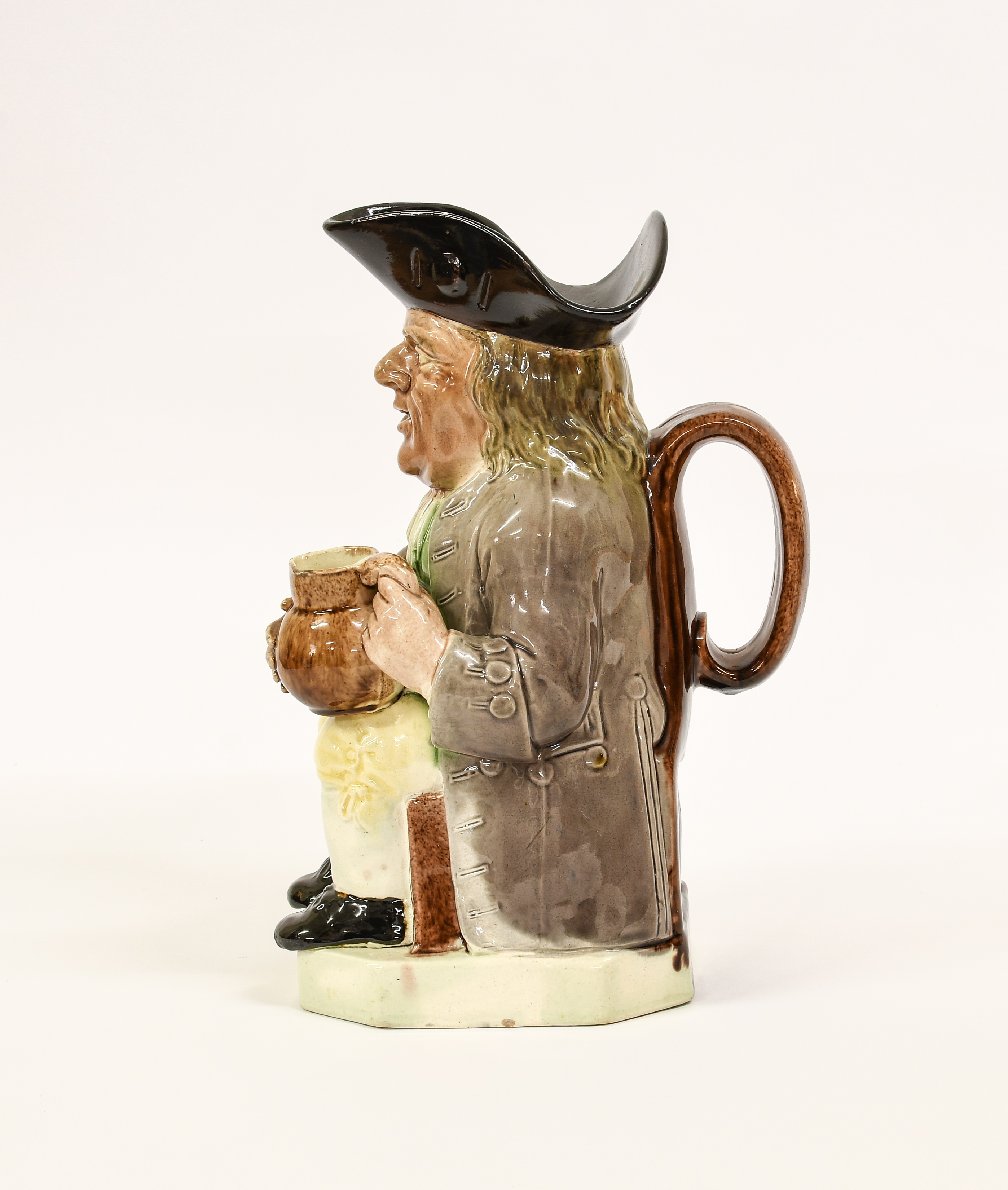 Lot 61 - A Ralph Wood Type Creamware Toby Jug, circa