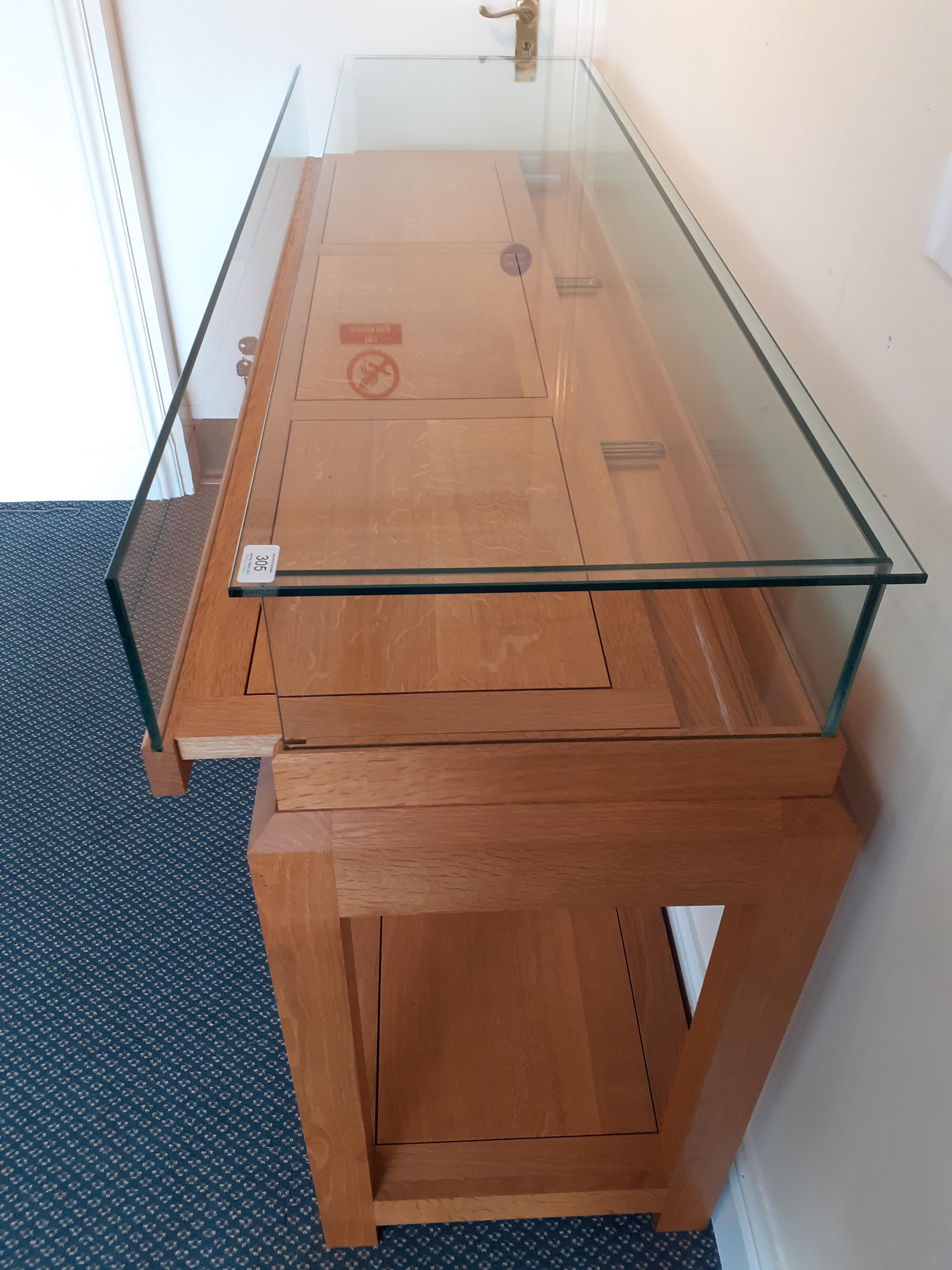 Lot 305 - A Modern Bespoke Oak Display Cabinet, made