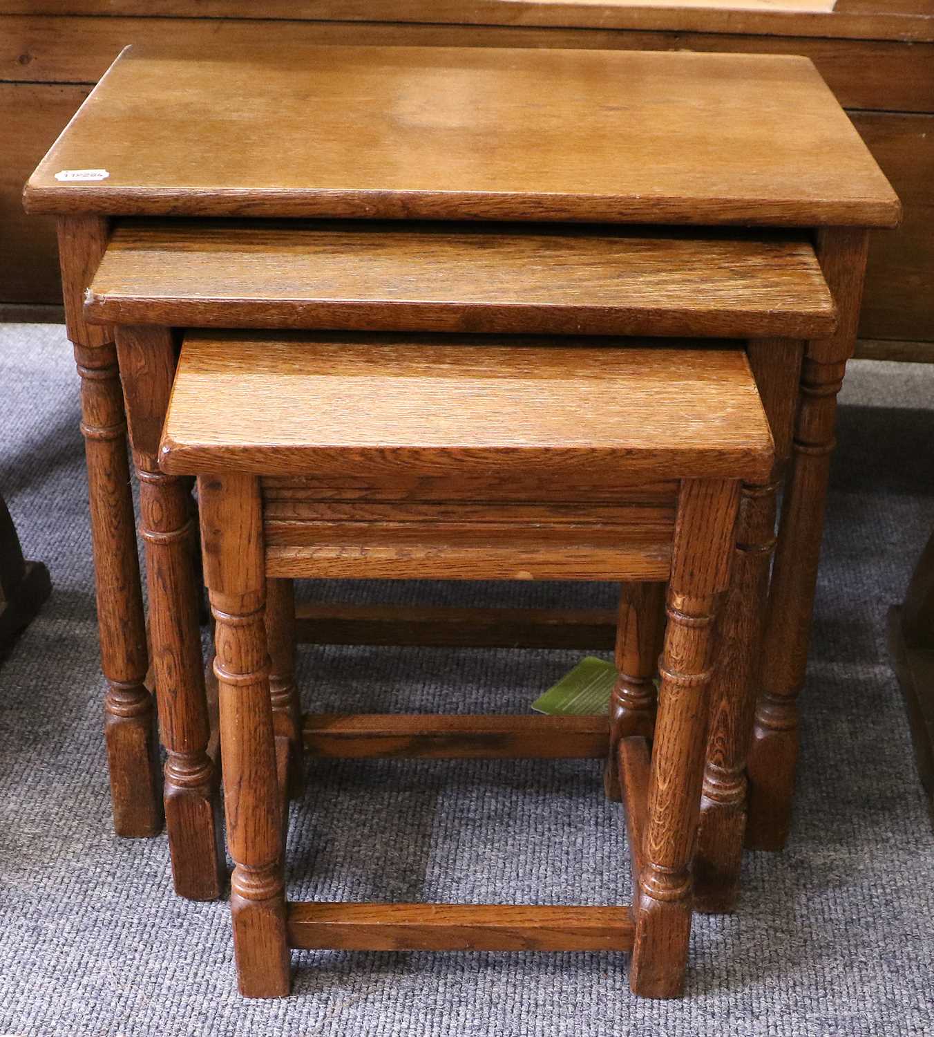Lot 1105 - A Nest Of Three Modern Oak Tables, largest