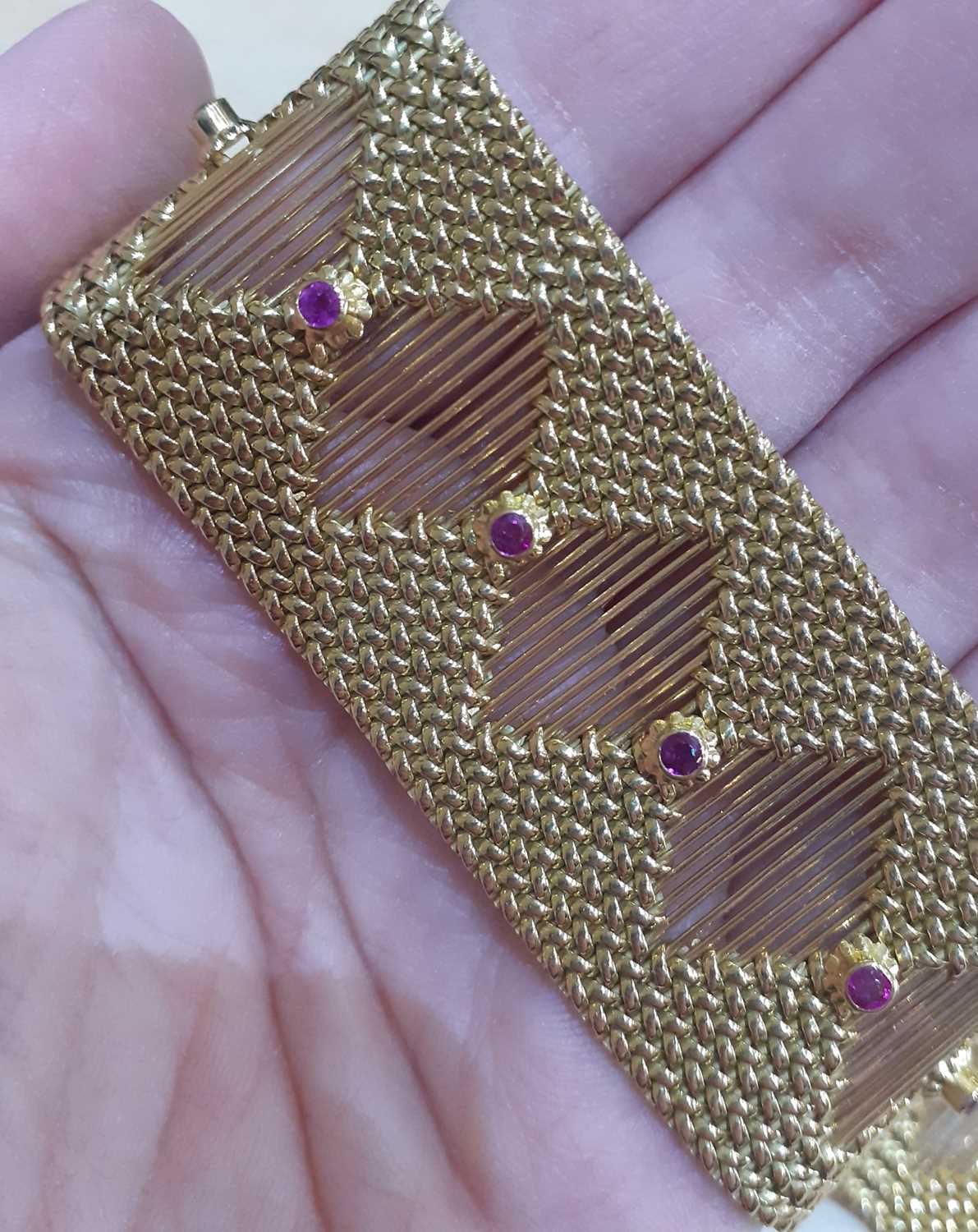 Lot 2253 - A Ruby Bracelet eleven kite motifs formed