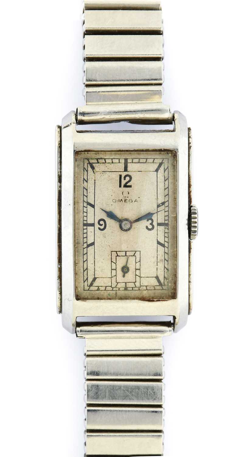 Lot 2402 - Omega: A Stainless Steel Curved Rectangular