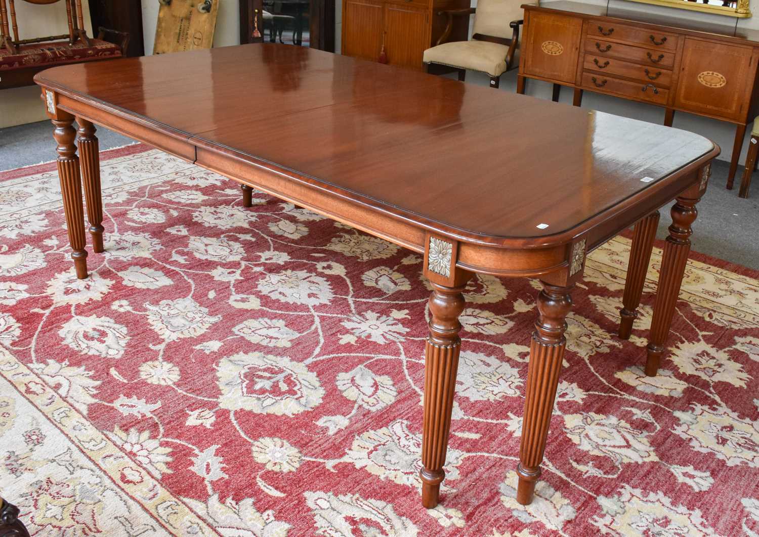 Lot 1130 - A Reproduction Mahogany Dining Table, in