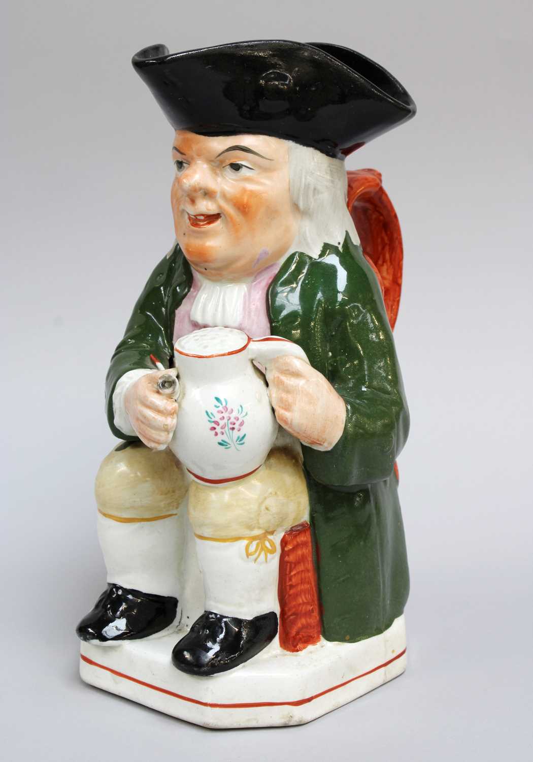 Lot 326 - A 19th Century Pearlware Toby Jug, of Wood