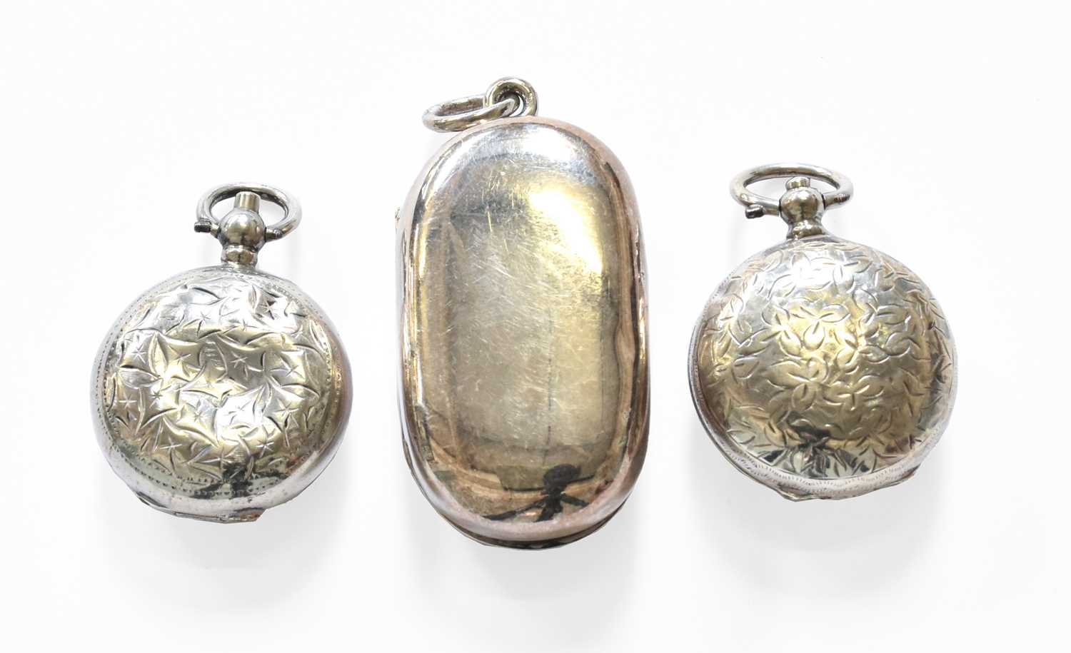 Lot 144 - Three Silver Sovereign Cases, two circular