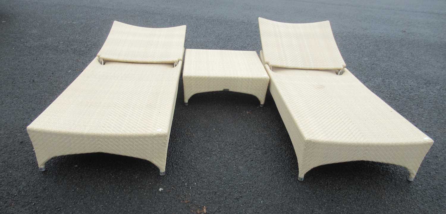 Lot 1195 - Dedon: A Pair of Rattan Effect Sun Loungers,