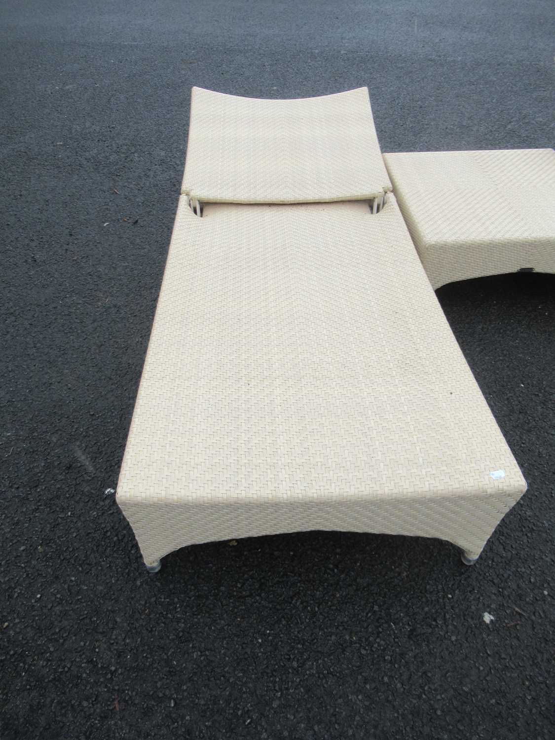 Lot 1195 - Dedon: A Pair of Rattan Effect Sun Loungers,