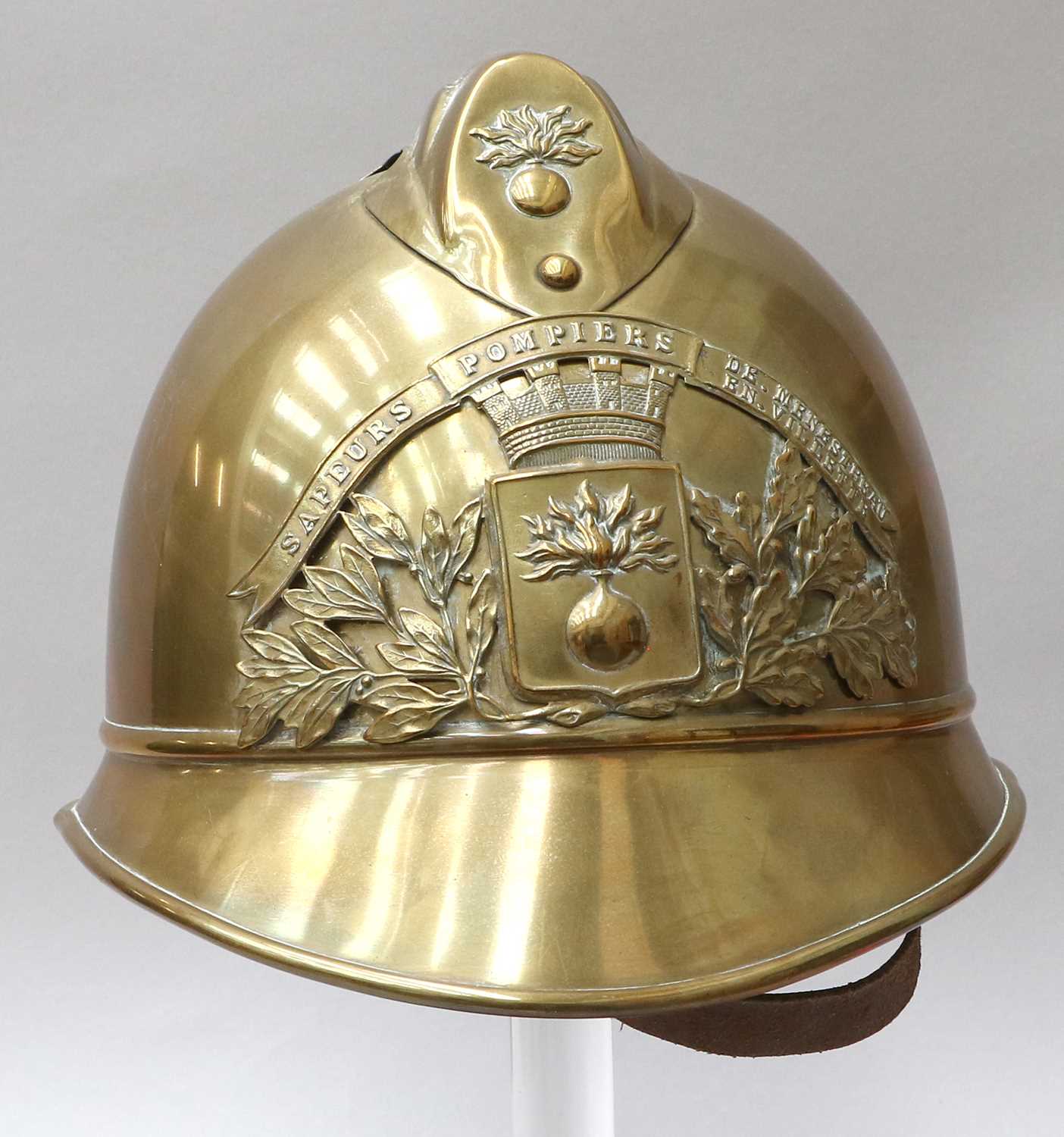 Lot 159 - A French Brass Adrian Fire Helmet, with