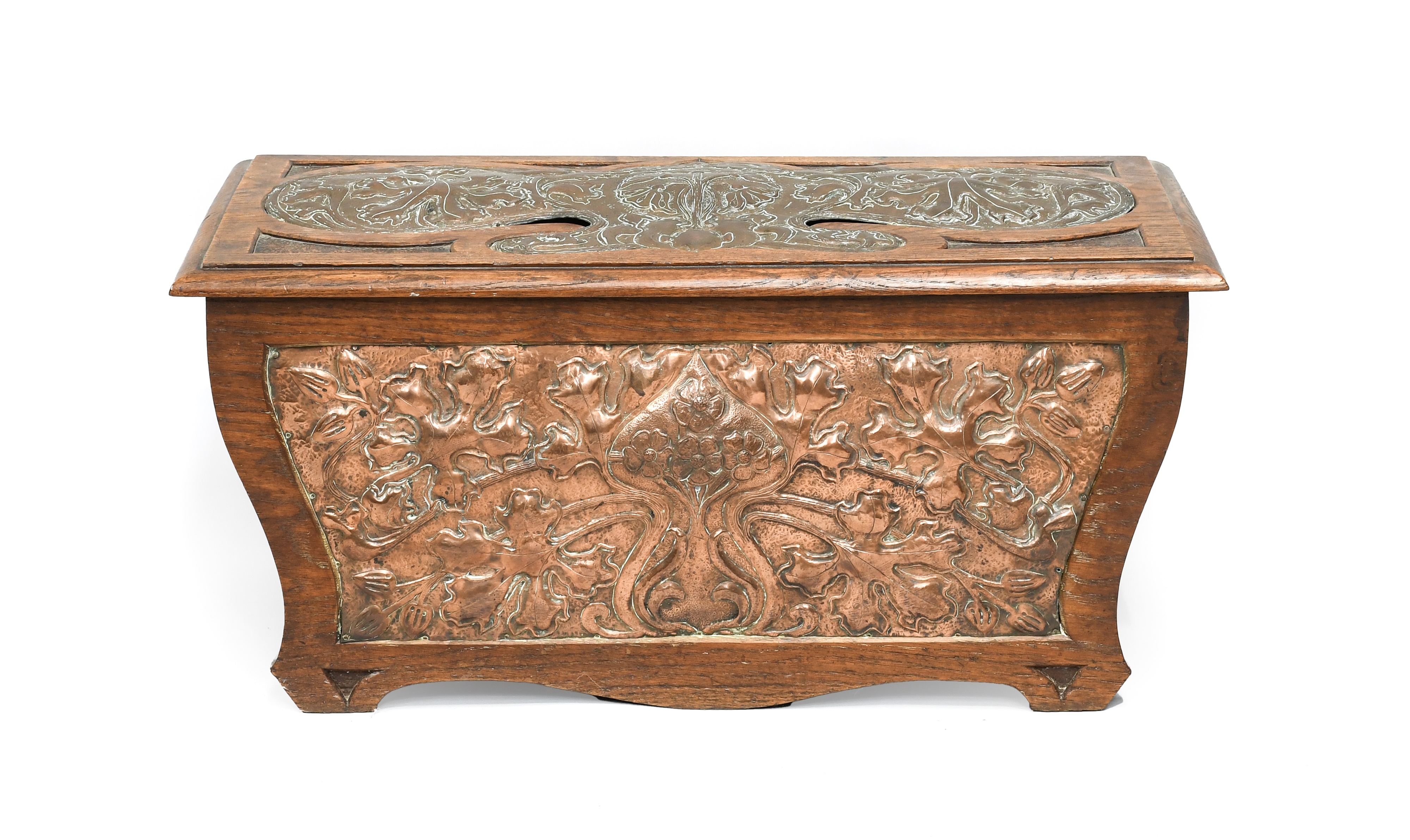 Lot 255 - An Art & Crafts Oak Log Box, the hinged lid,