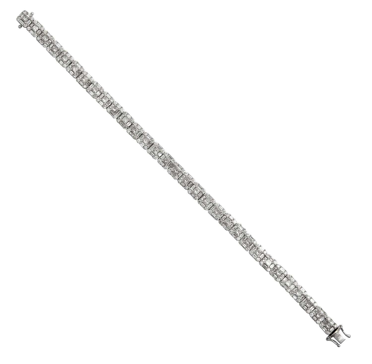 Lot 2228 - A Diamond Line Bracelet thirty-one clusters