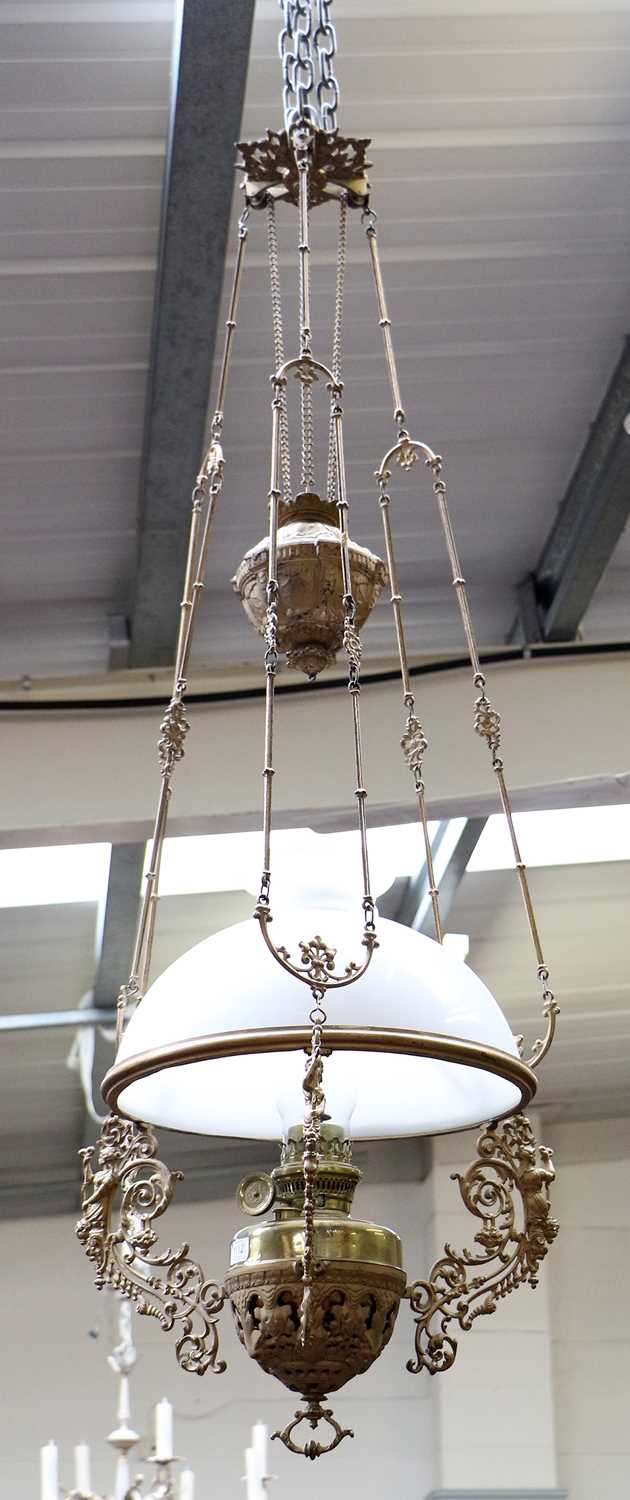 Lot 1112 - A Gilt Metal Rise and Fall Ceiling Light,