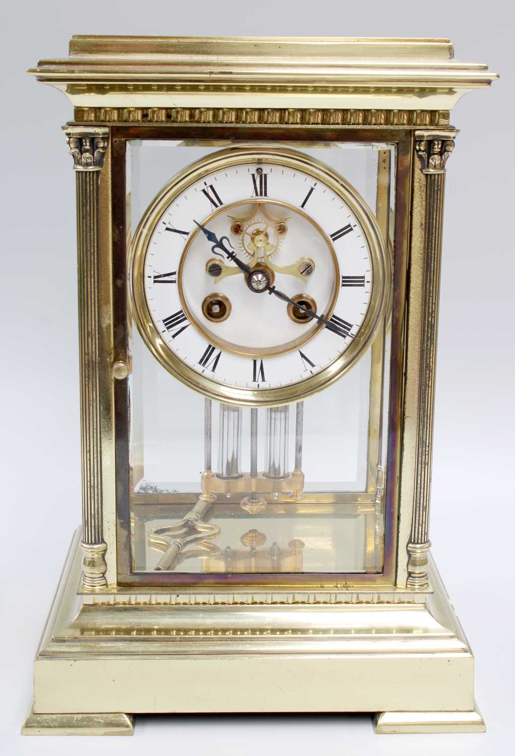 Lot 332 - A Brass Four Glass Striking Mantel Clock,