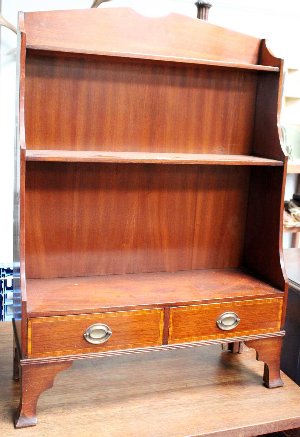 Lot 1220 - A Reproduction Mahogany Waterfall Bookcase,