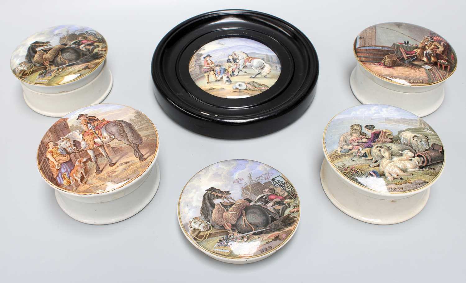 Lot 378 - Four Pratt Pomade Pots and Lids, depicting