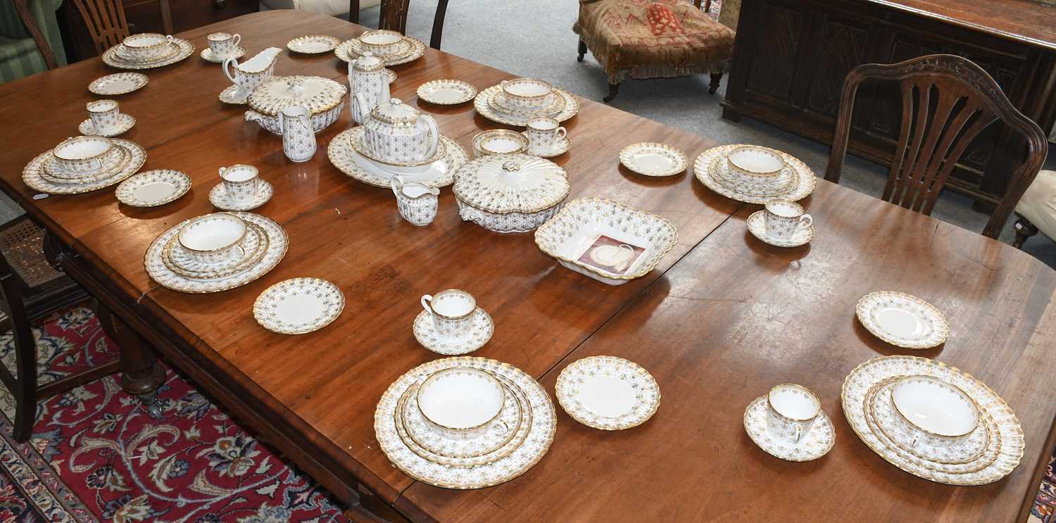 Lot 443 - A Spode Dinner Service Fluer de Lys Gold