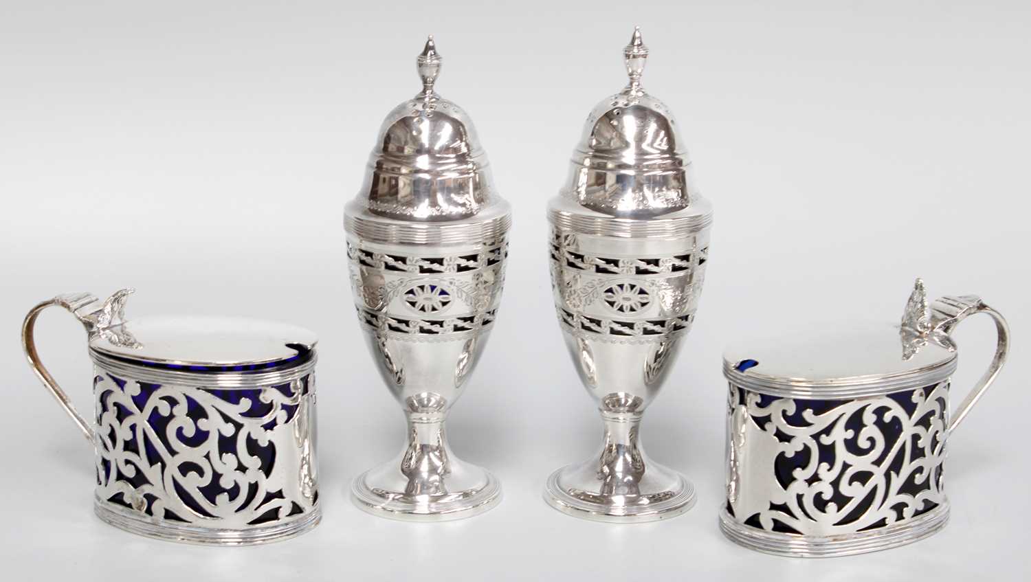 Lot 1097 - A Pair of Victorian Silver Pepperettes, by