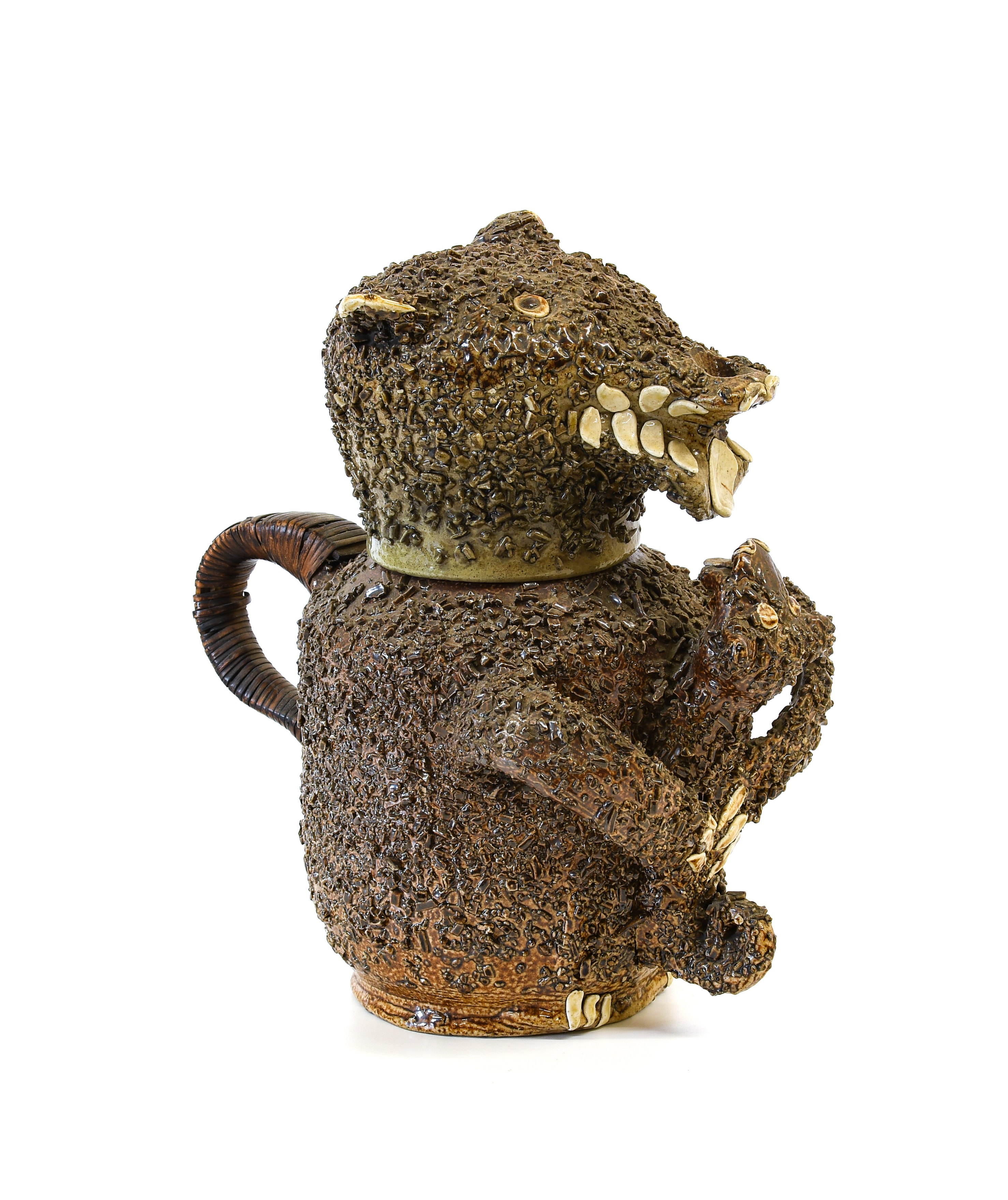 Lot 63 - A Nottingham Stoneware Bear Jug and Cover,
