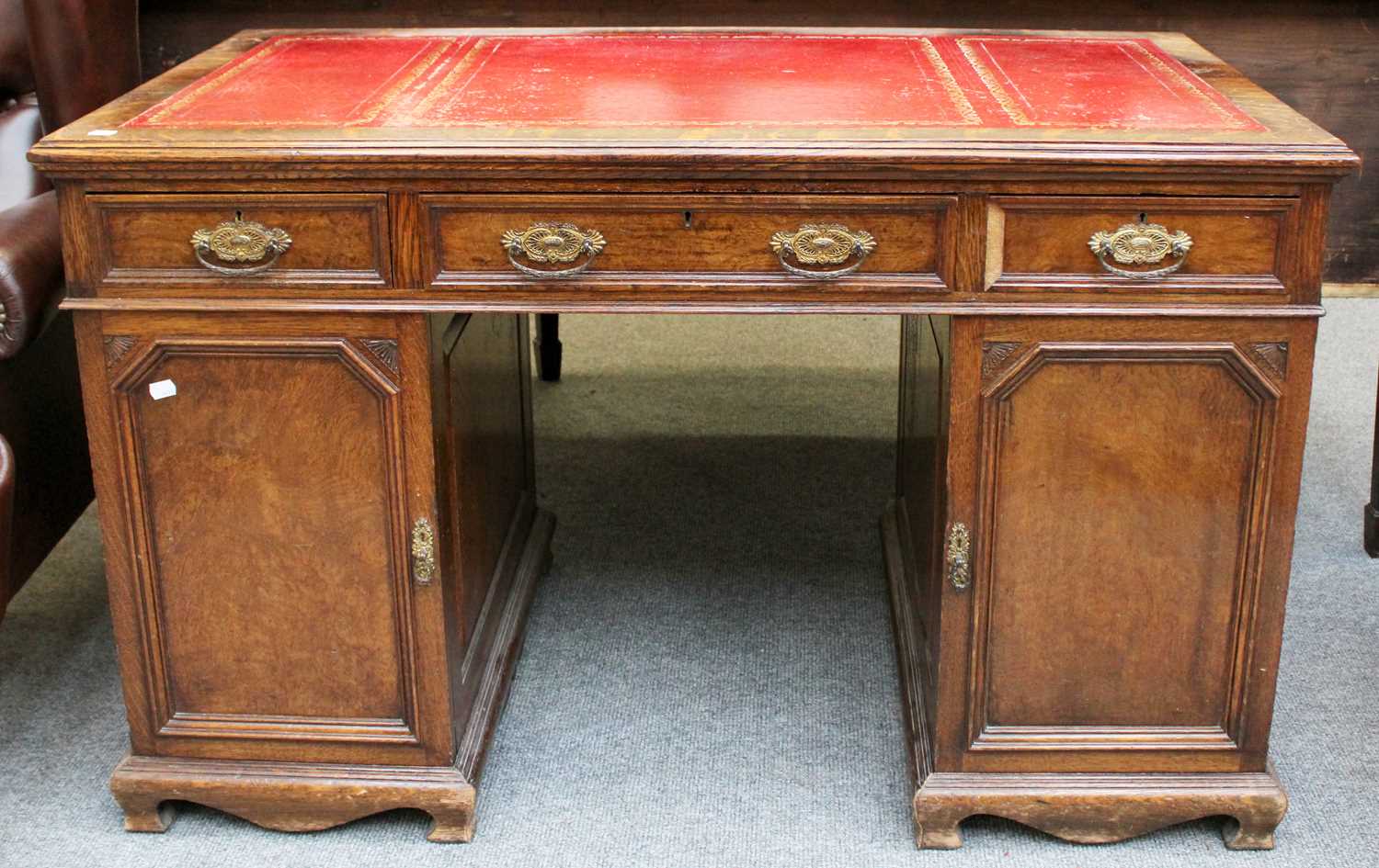 Lot 1113 - A Red Leather Inset Oak Pedestal Desk,