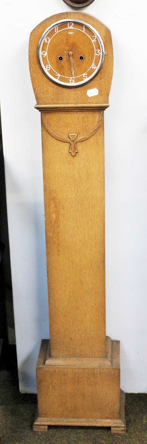 Lot 1236 - A 1920s Smiths Small Oak Longcase Clock,