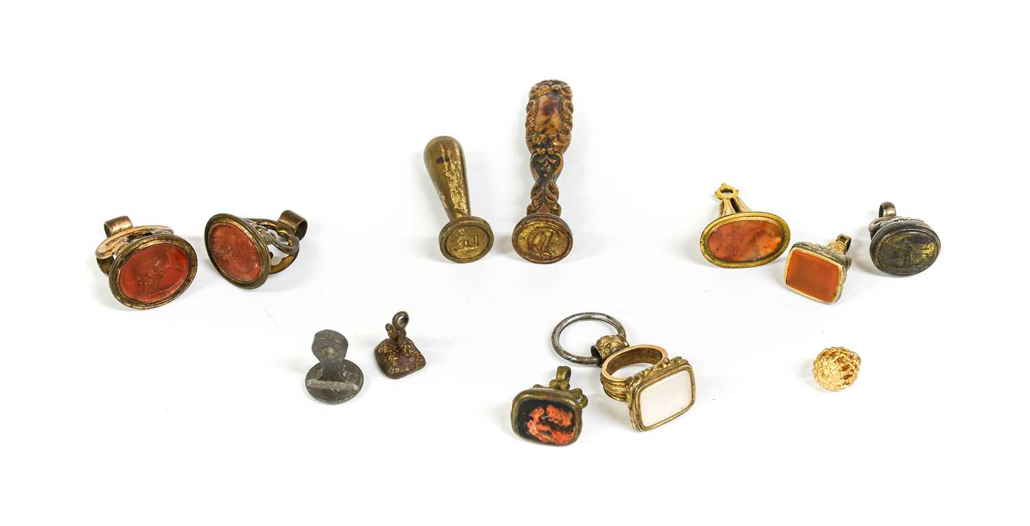 Lot 382 - A Regency Gilt Metal Fob Seal, with scroll