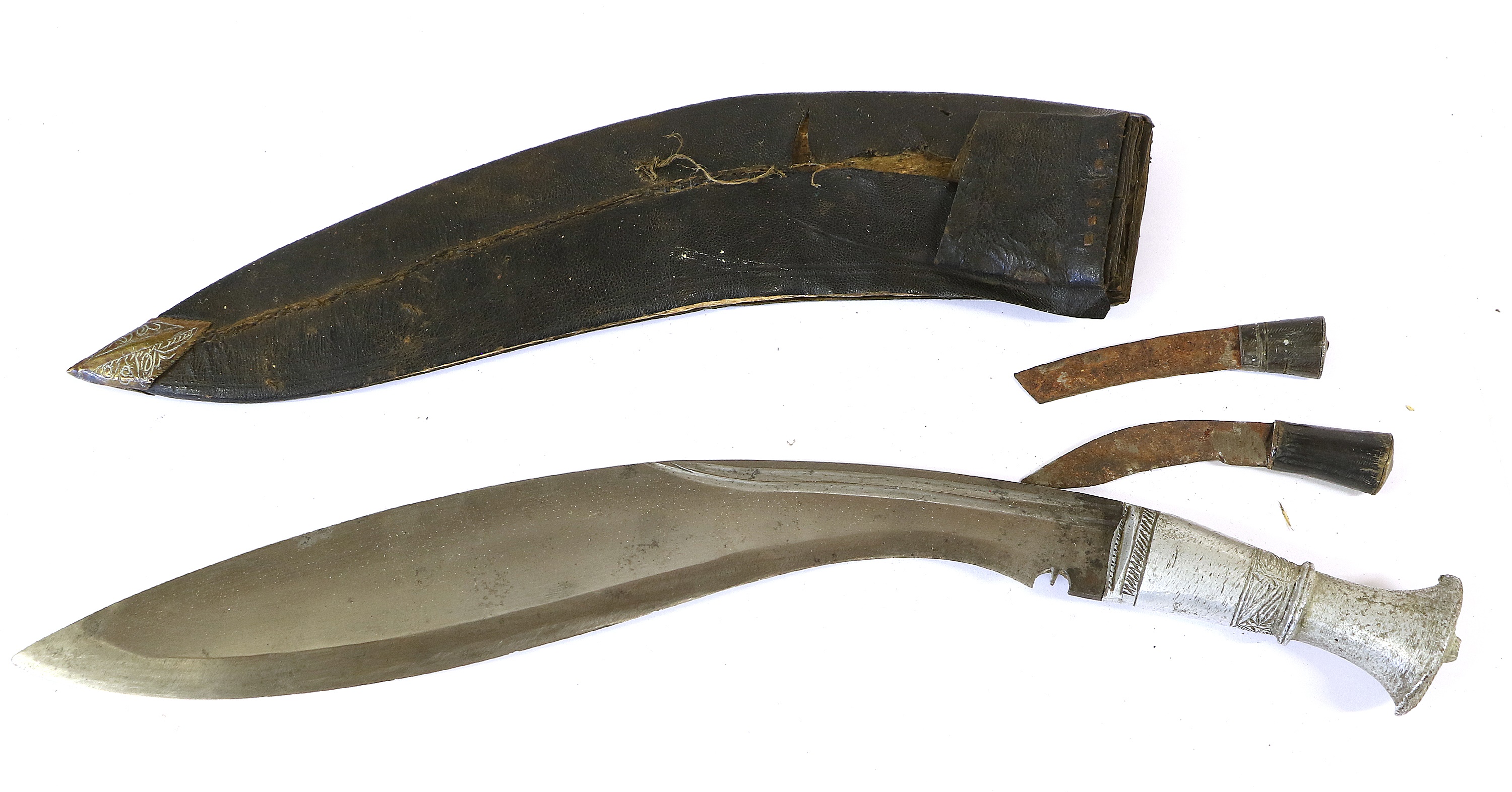 Lot 199 - Seven Indian Kukris, of varying sizes, four