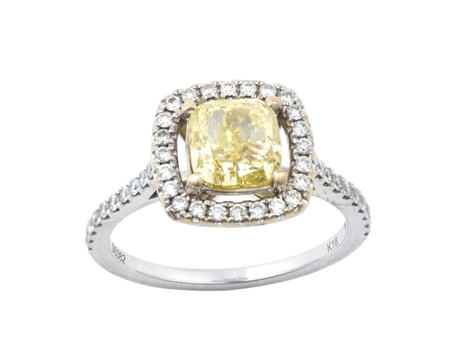 Lot 2340 - A Diamond Cluster Ring the fancy intense