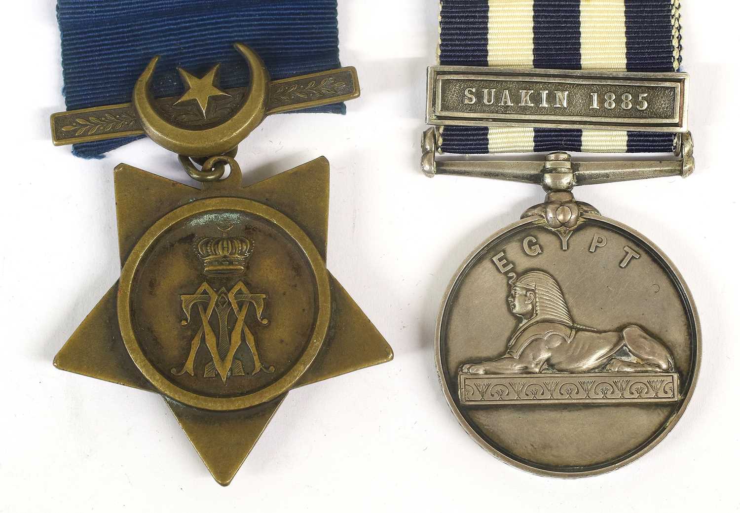 Lot 34 - A Victorian Egypt Pair 1882-1889, comprising