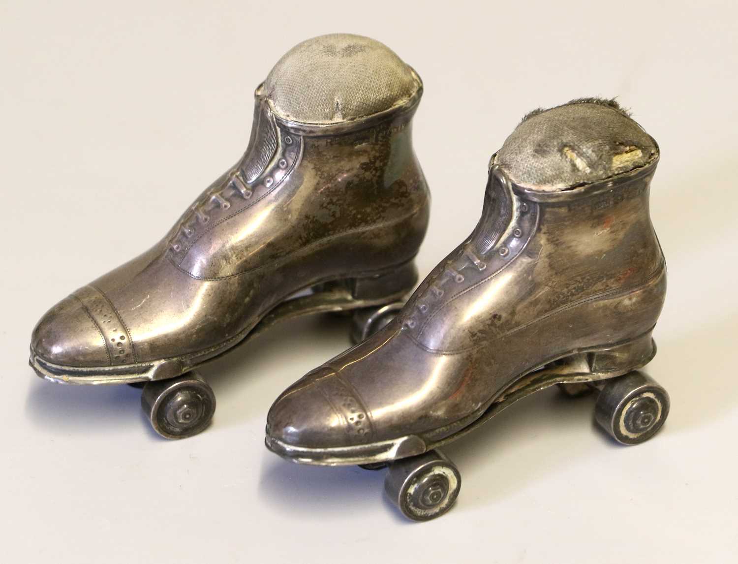 Lot 2069 - Two Early 20th Century Silver Roller Skate