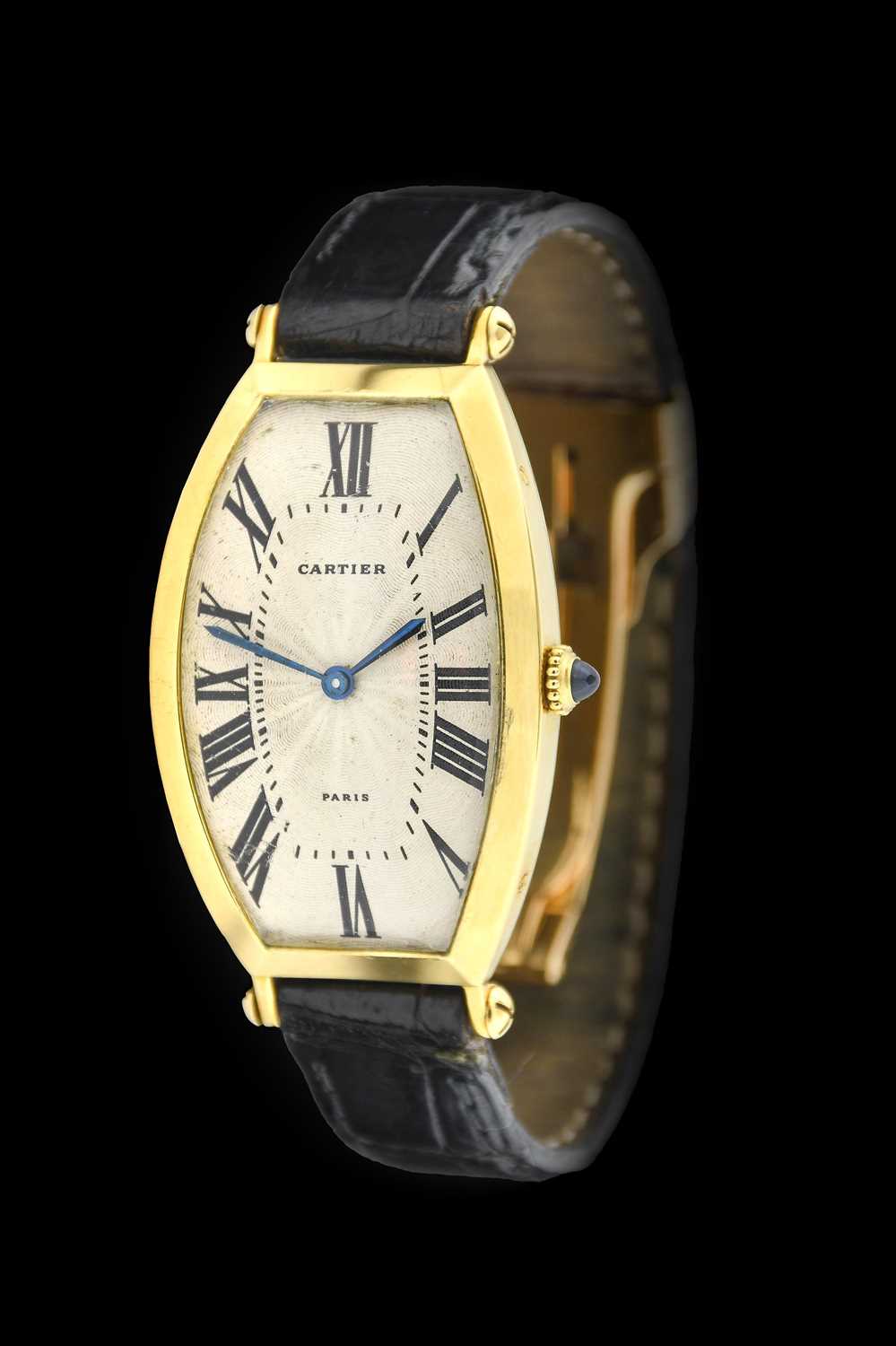 Lot 2306 - Cartier: A Tonneau Shaped 18 Carat Gold