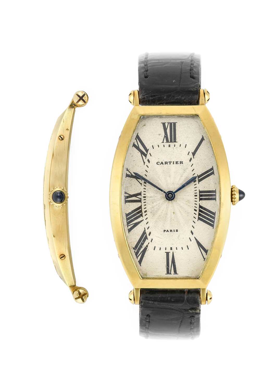 Lot 2190 - Cartier: A Tonneau Shaped 18 Carat Gold