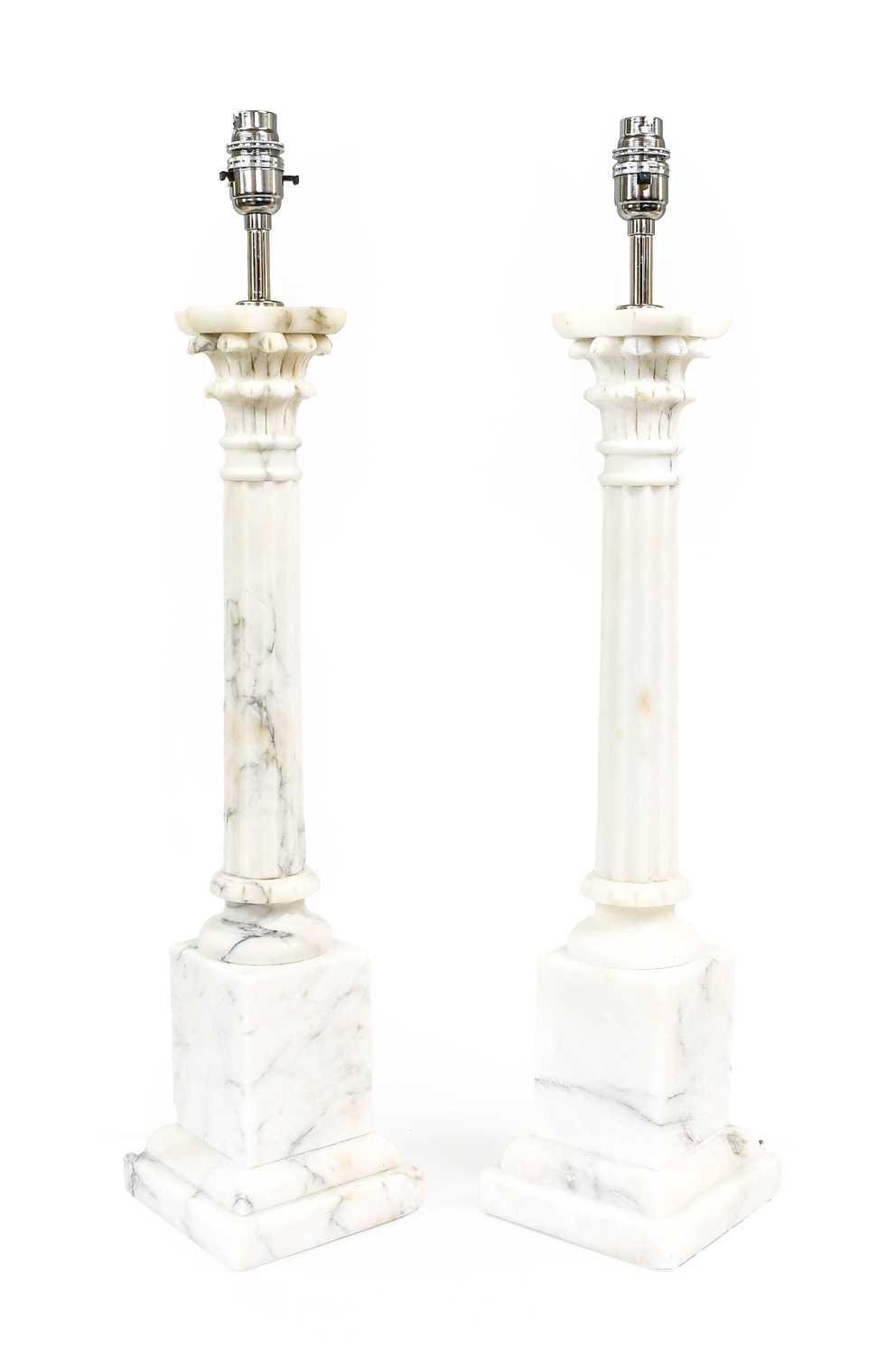 Lot 235 - A Pair of Veined Alabaster Lamp Bases, in