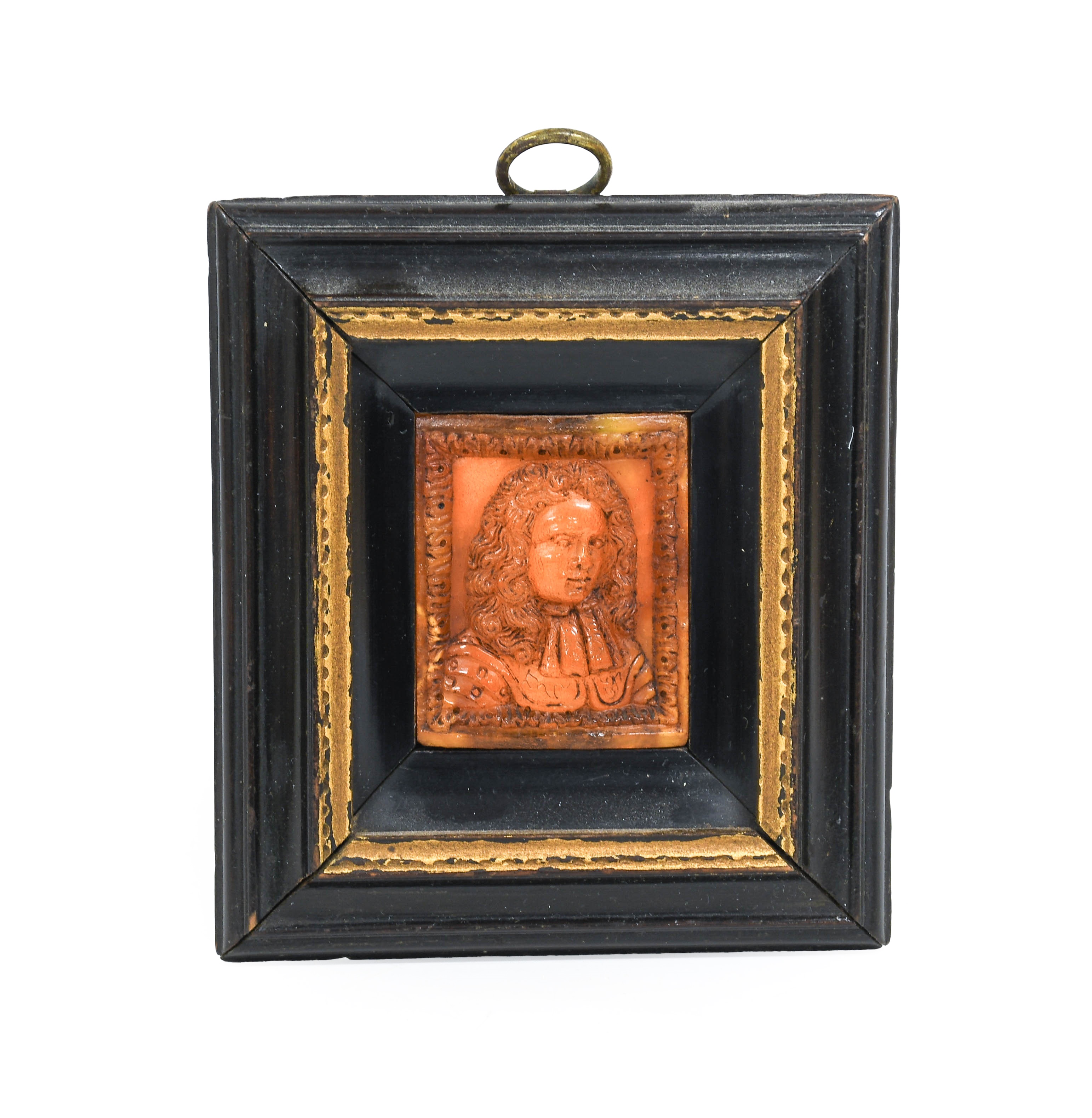 Lot 262 - A Carved Amber Panel, probably 17th century,
