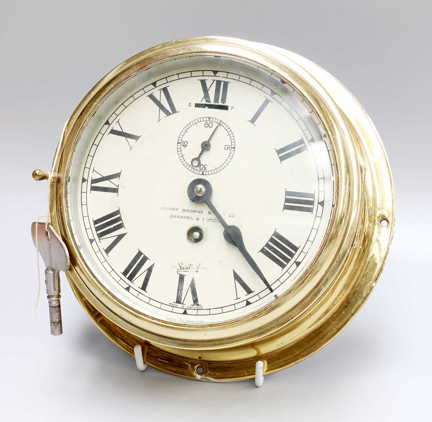 Lot 200 - A Brass Ships Type Bulk Head Wall Timepiece,