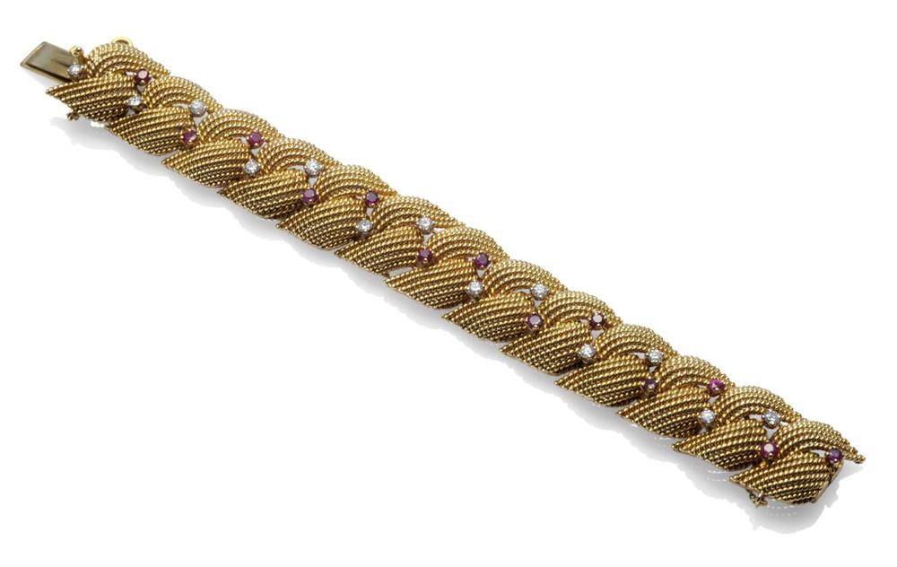 Lot 542 - A Diamond and Ruby Set Bracelet, by Sanz,