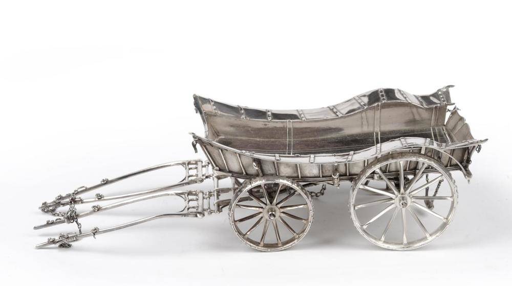 Lot 572 - A White Metal Model of a Wagon, American,